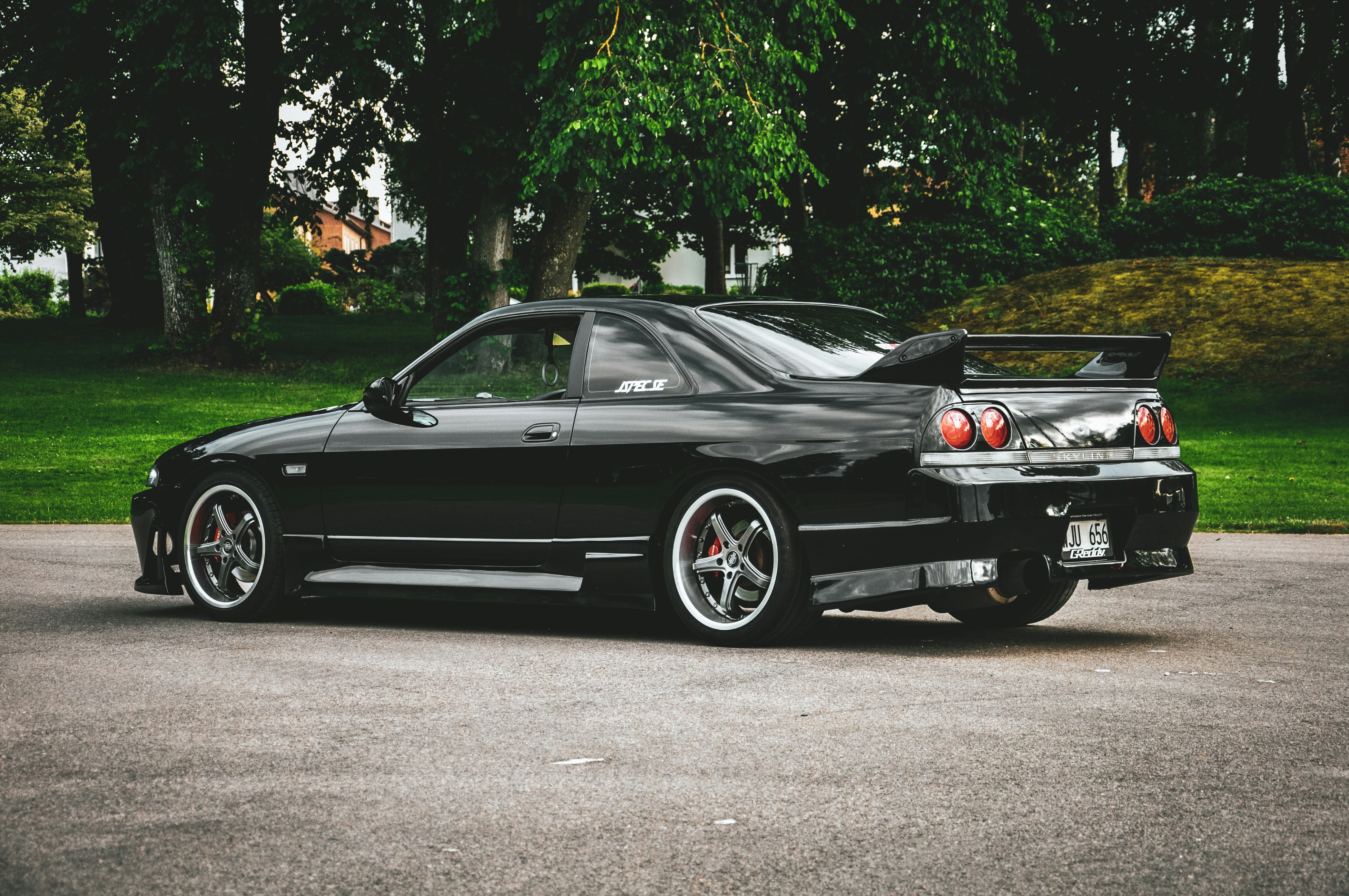 Black Nissan Skyline GT-R coupe parking near road photo – Free Car ...