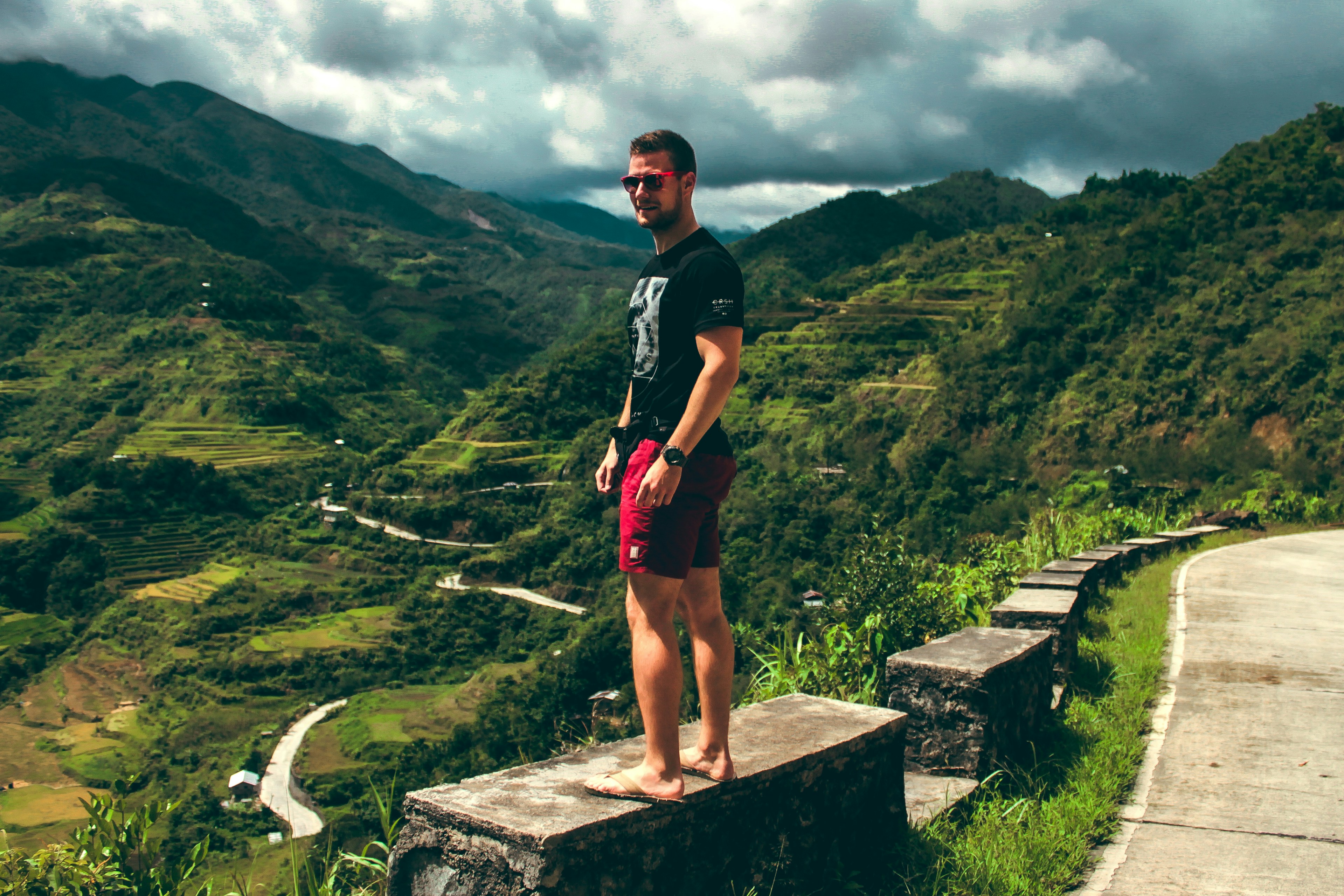 Man standing on concrete bench during daytime photo – Free Cambulo ...