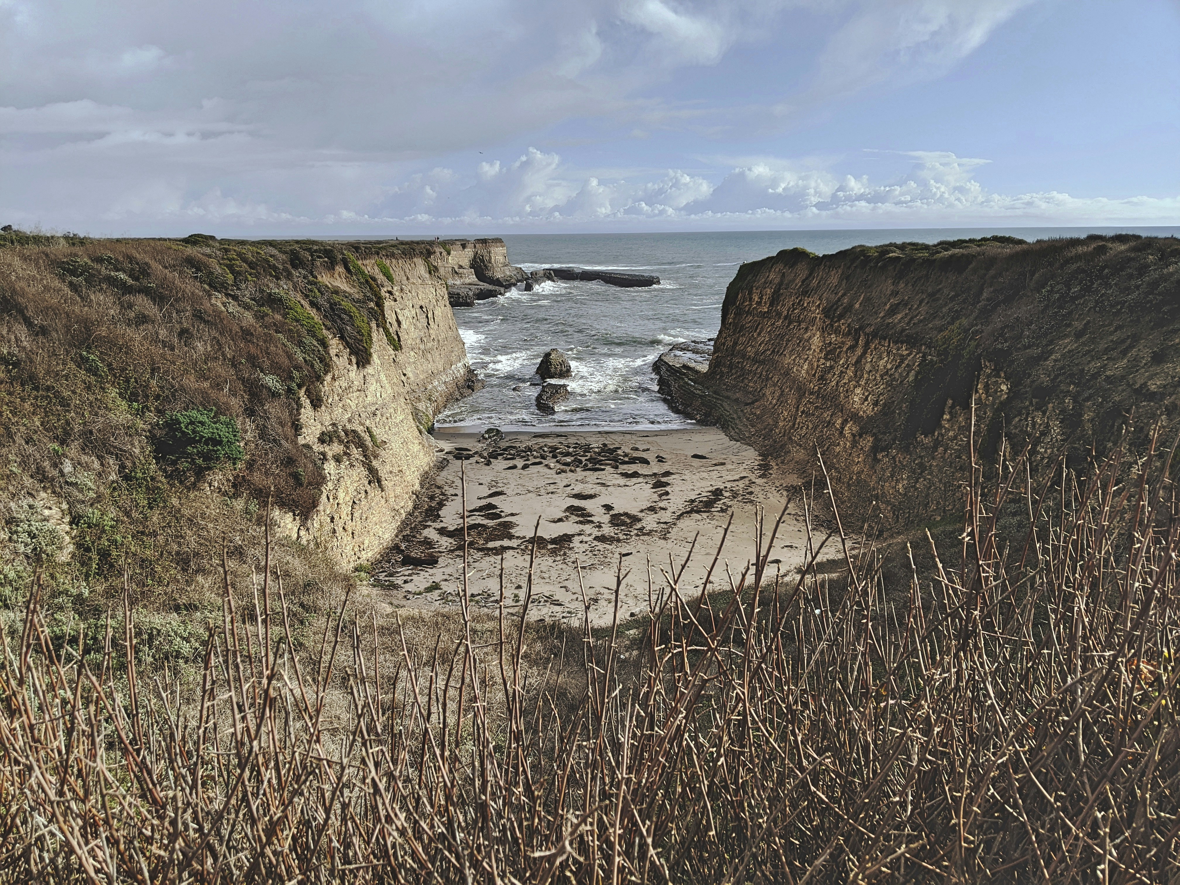 Whittled Cliffs Framing a Secluded Cove