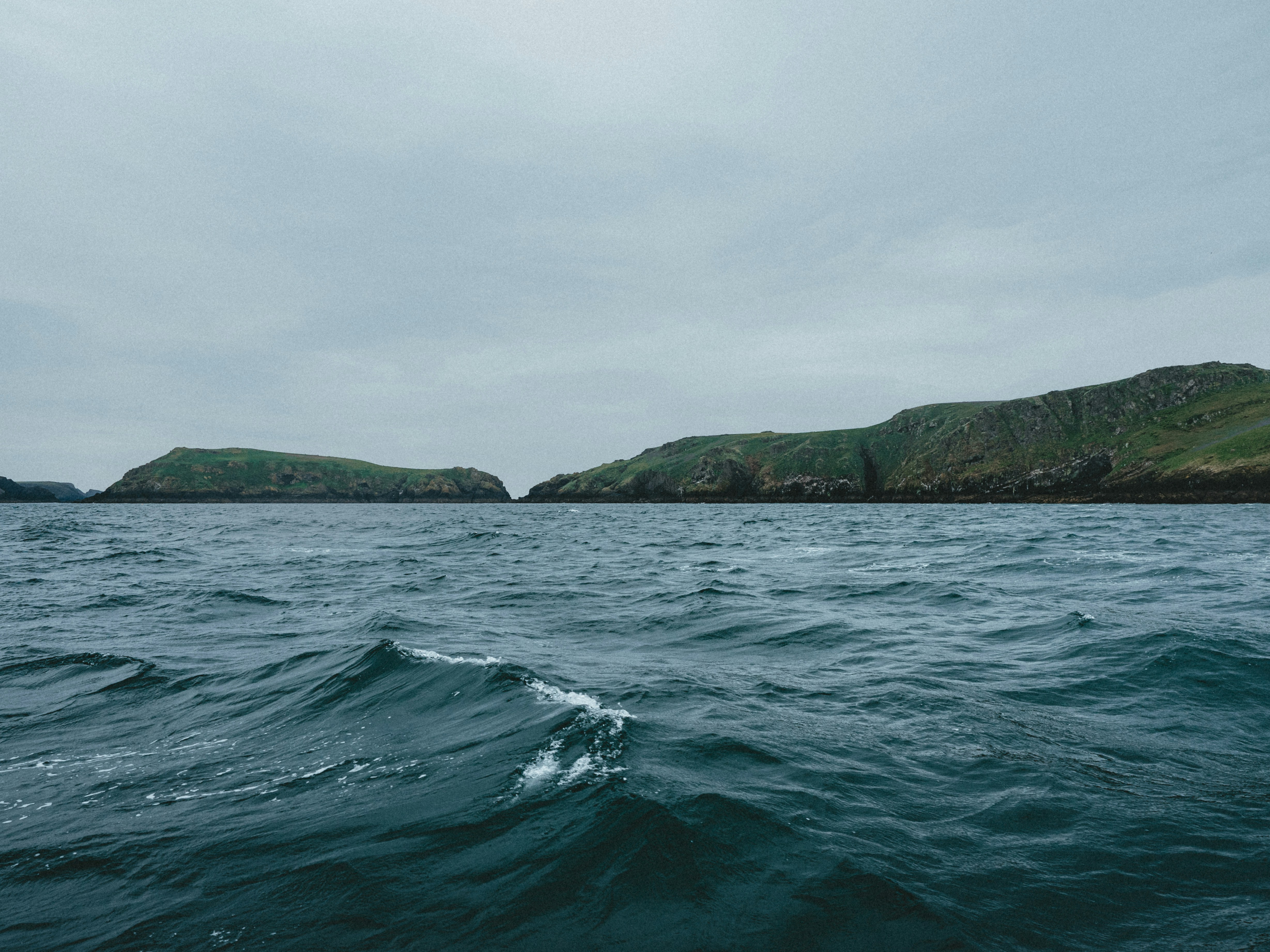Islet on sea photo – Free Grey Image on Unsplash