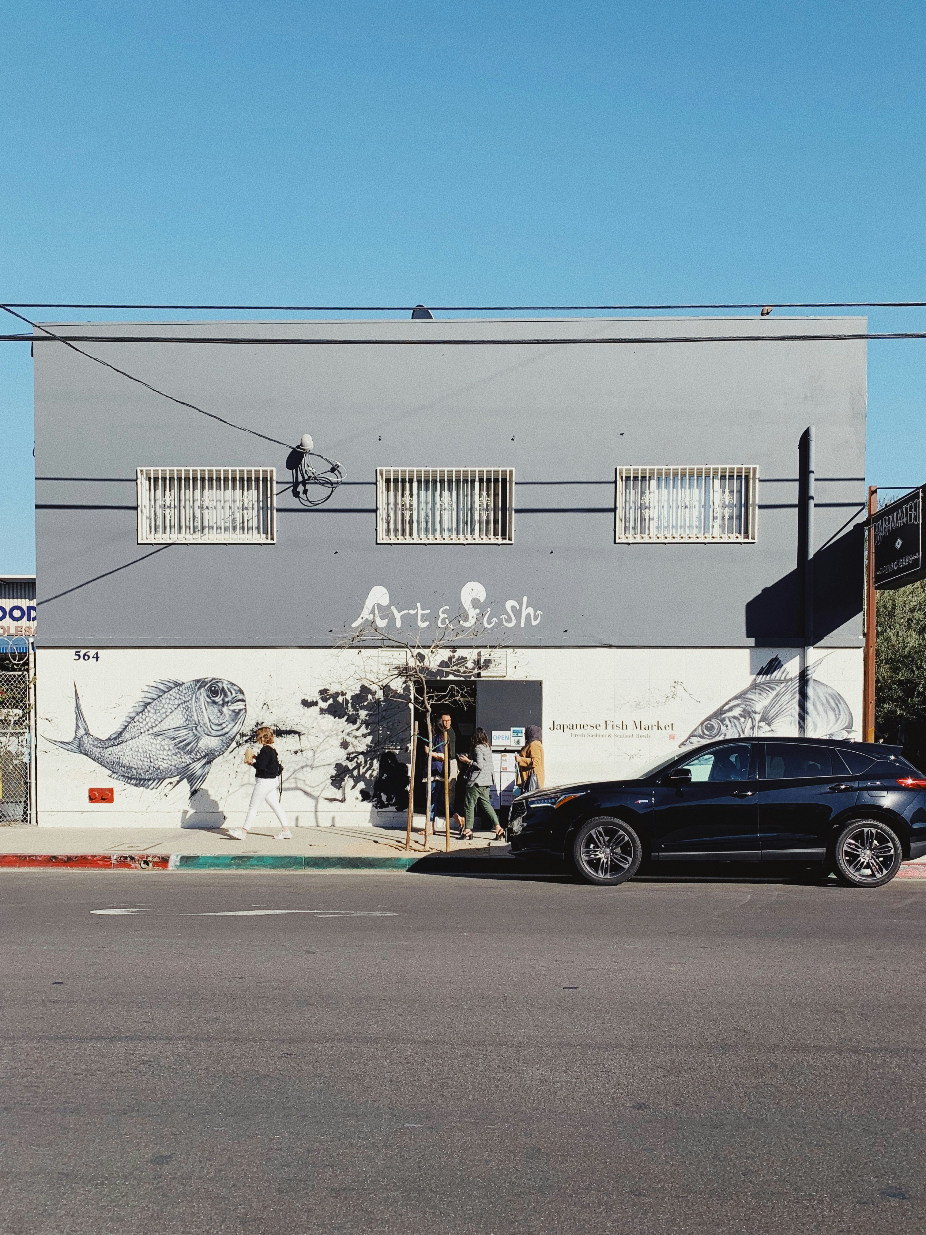 Art & Sushi on a Sunlit Streetfront