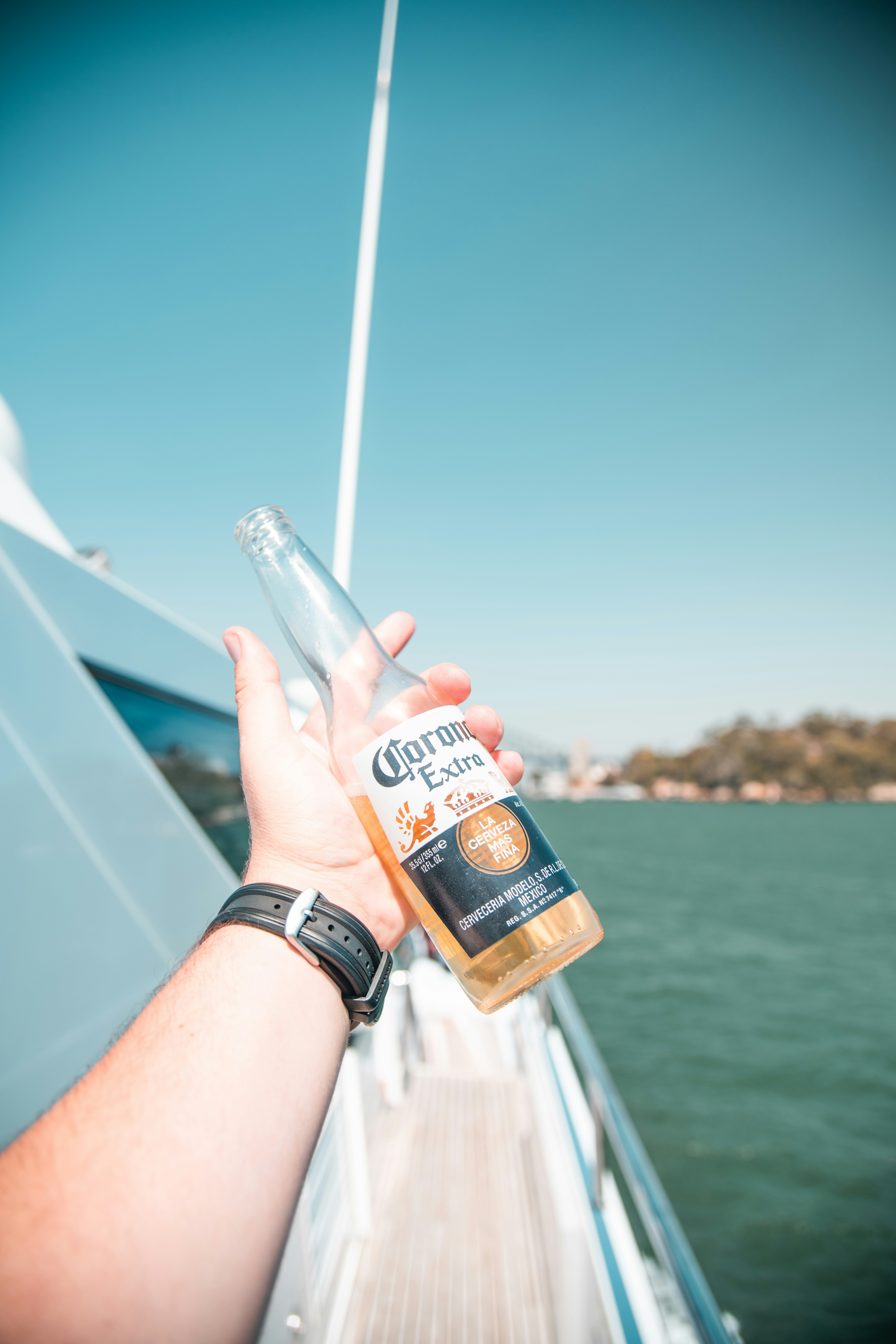 Corona at the Bow: A Sunlit Handheld Moment Aboard a Boat