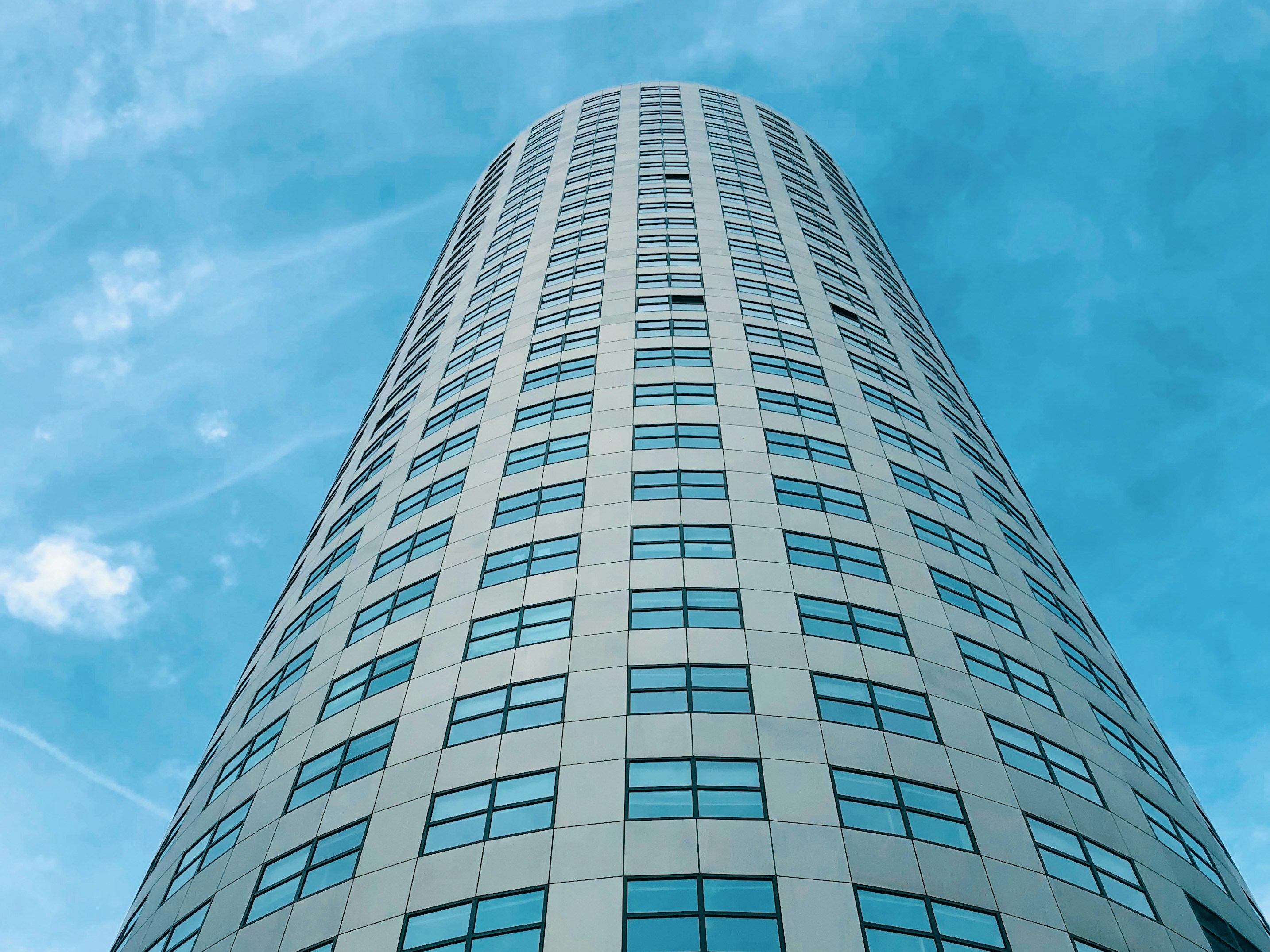 Low-angle photography of a blue high-rise building photo – Free ...