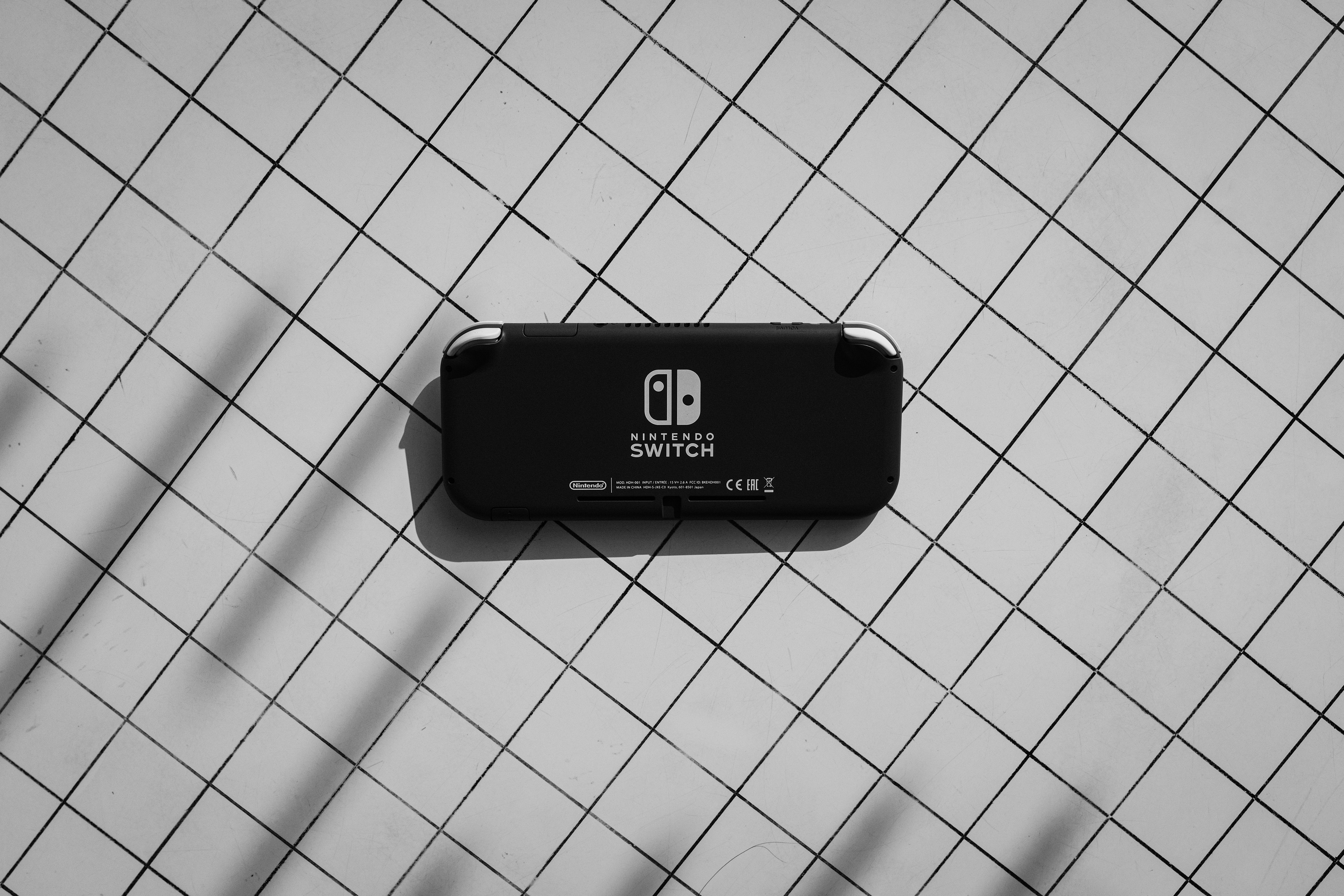 Black Nintendo Switch handheld console photo – Free Black Image on Unsplash