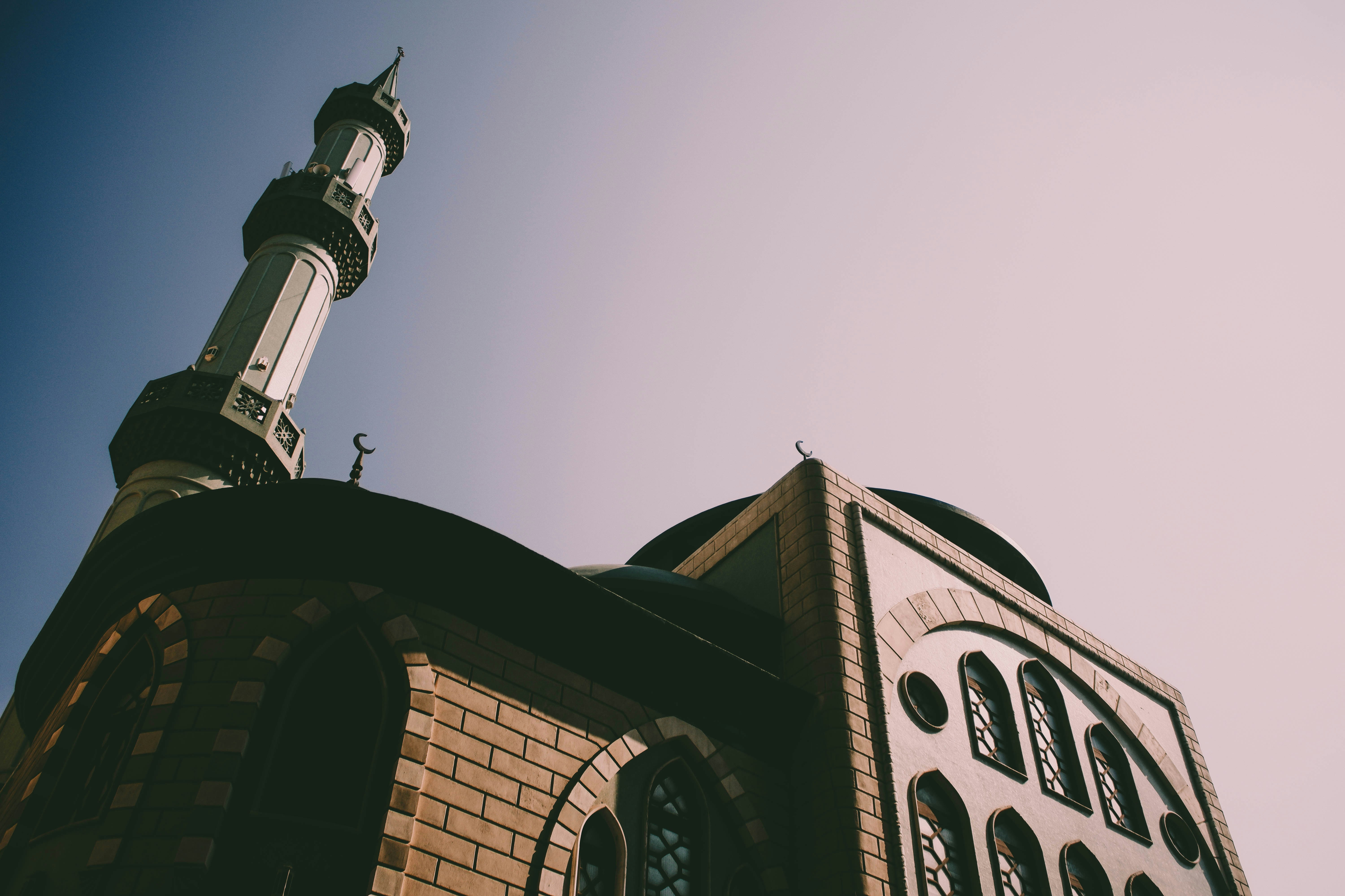 Worm view photo of brown building photo – Free Building Image on Unsplash