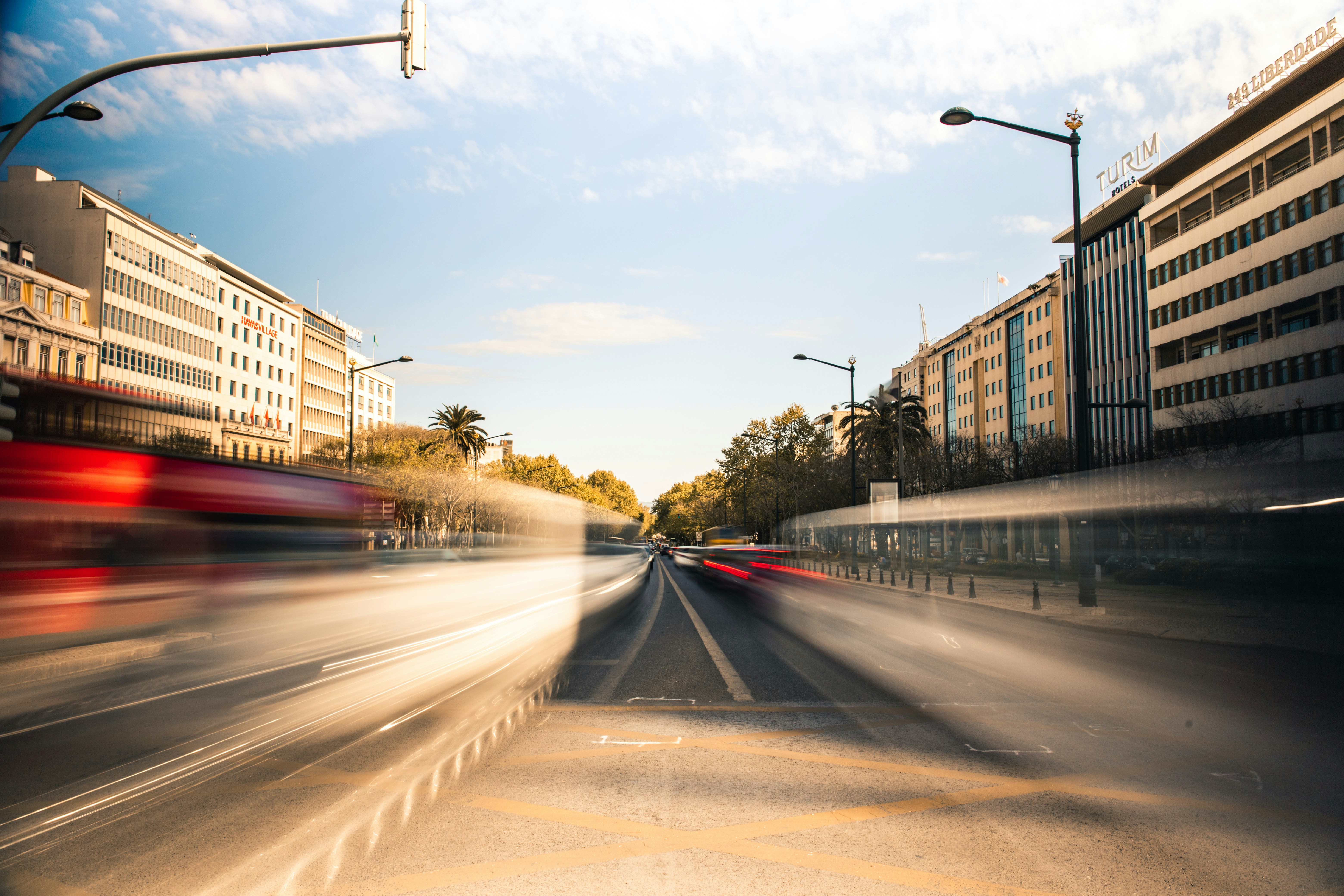 Cars passing on road during daytime photo – Free Lisbon Image on Unsplash