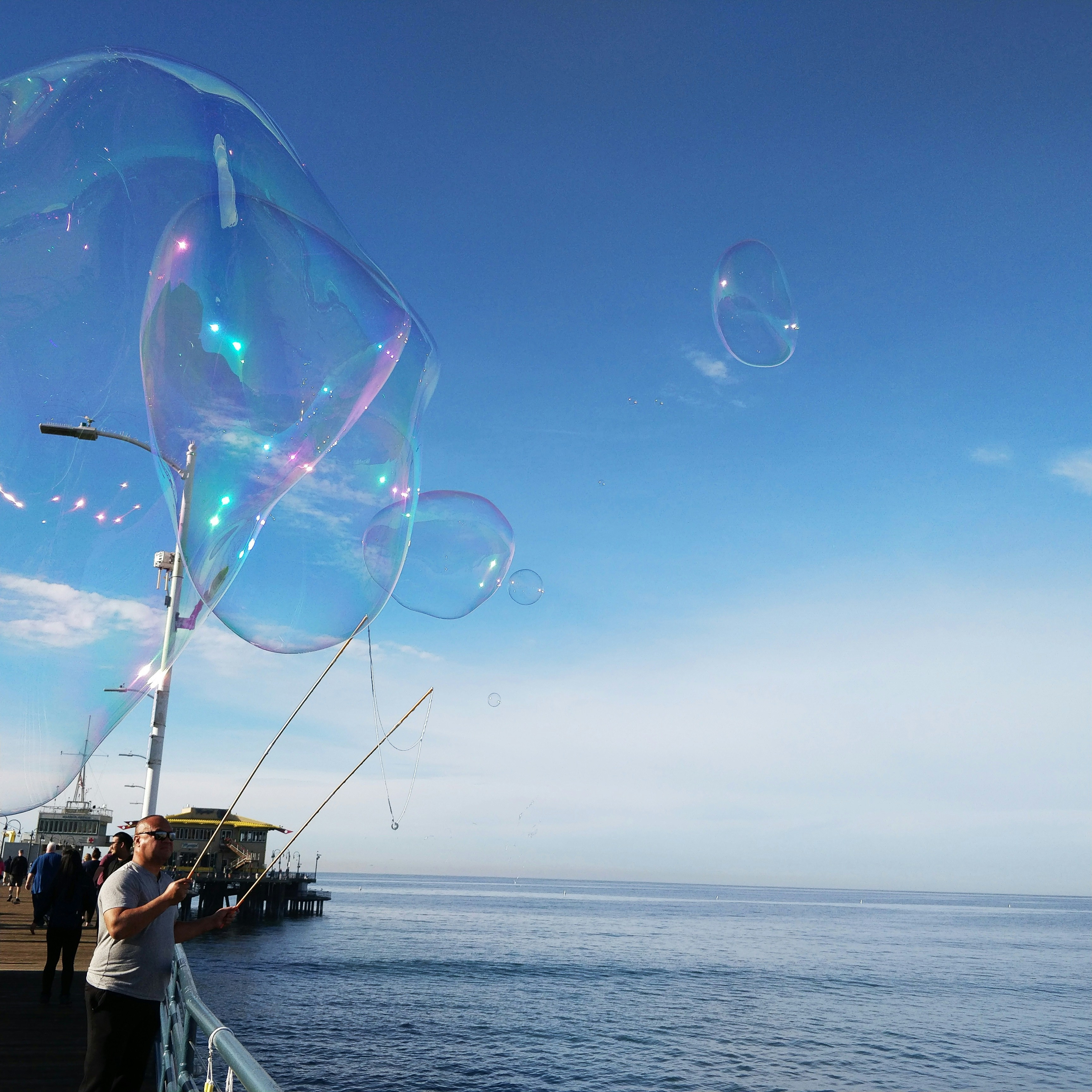 Bubble Performers by the Sea Edge