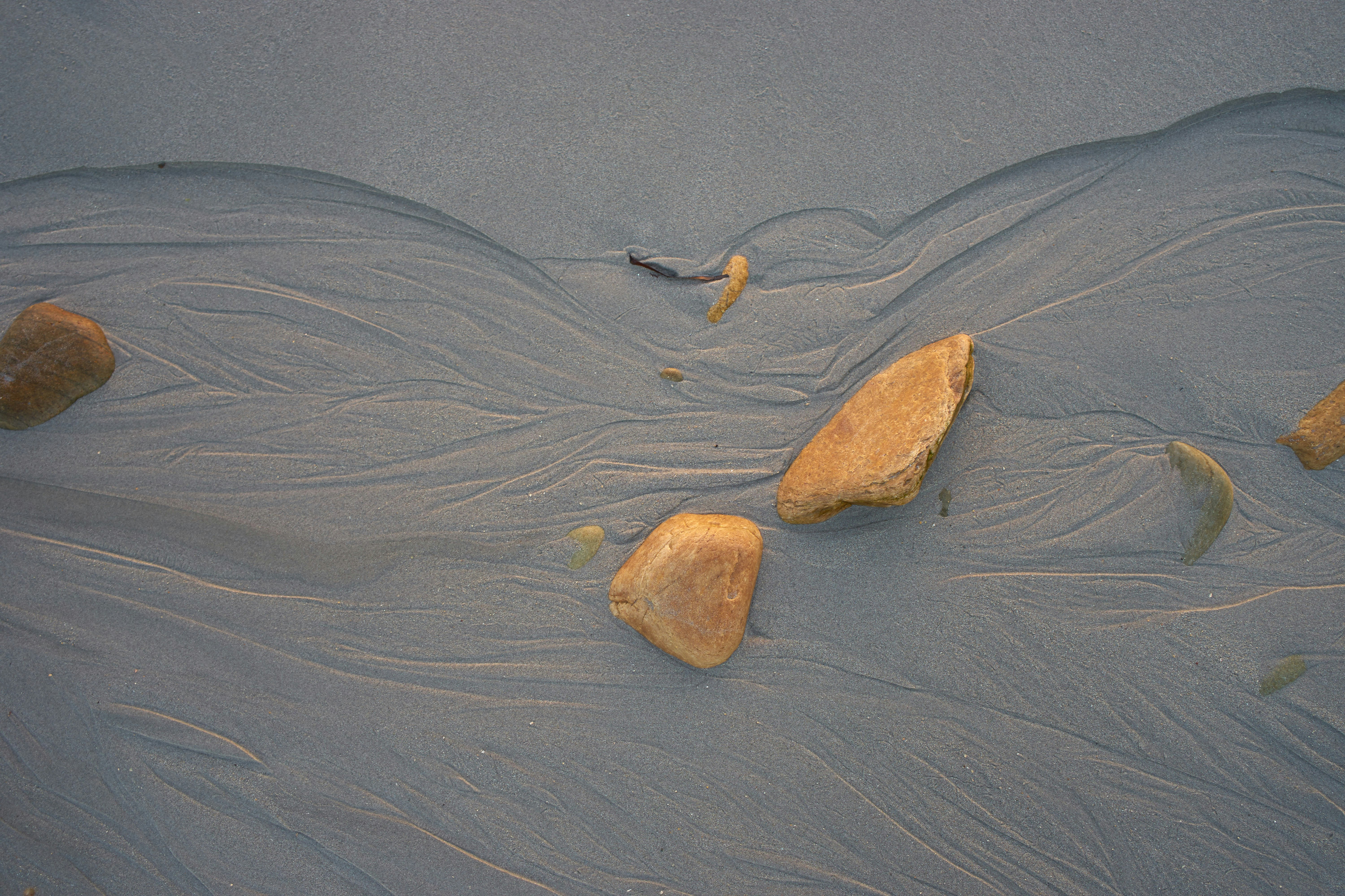 Two brown stone fragments photo – Free Beach Image on Unsplash