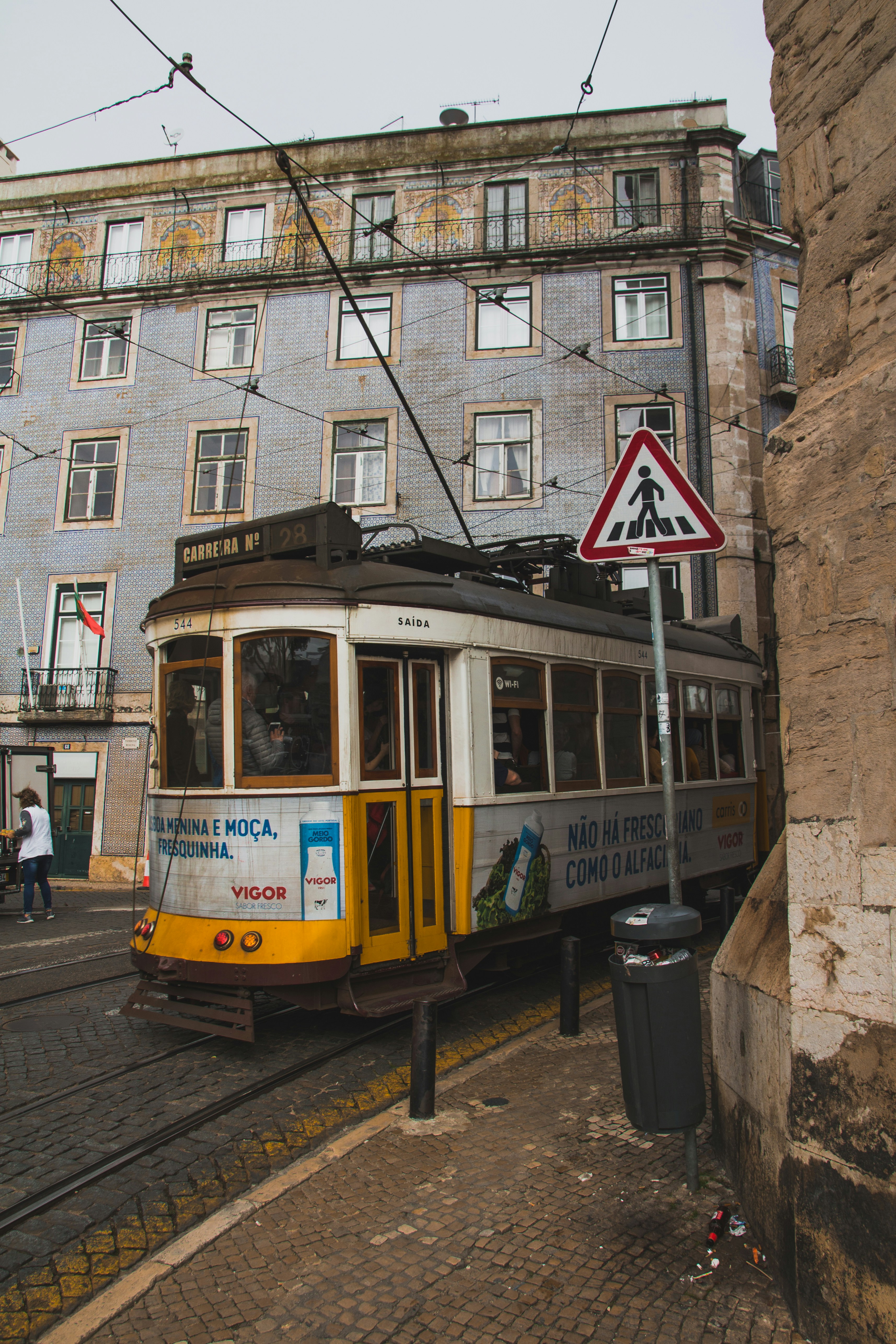 Cable train beside the sidewalk and buildings during day photo – Free ...
