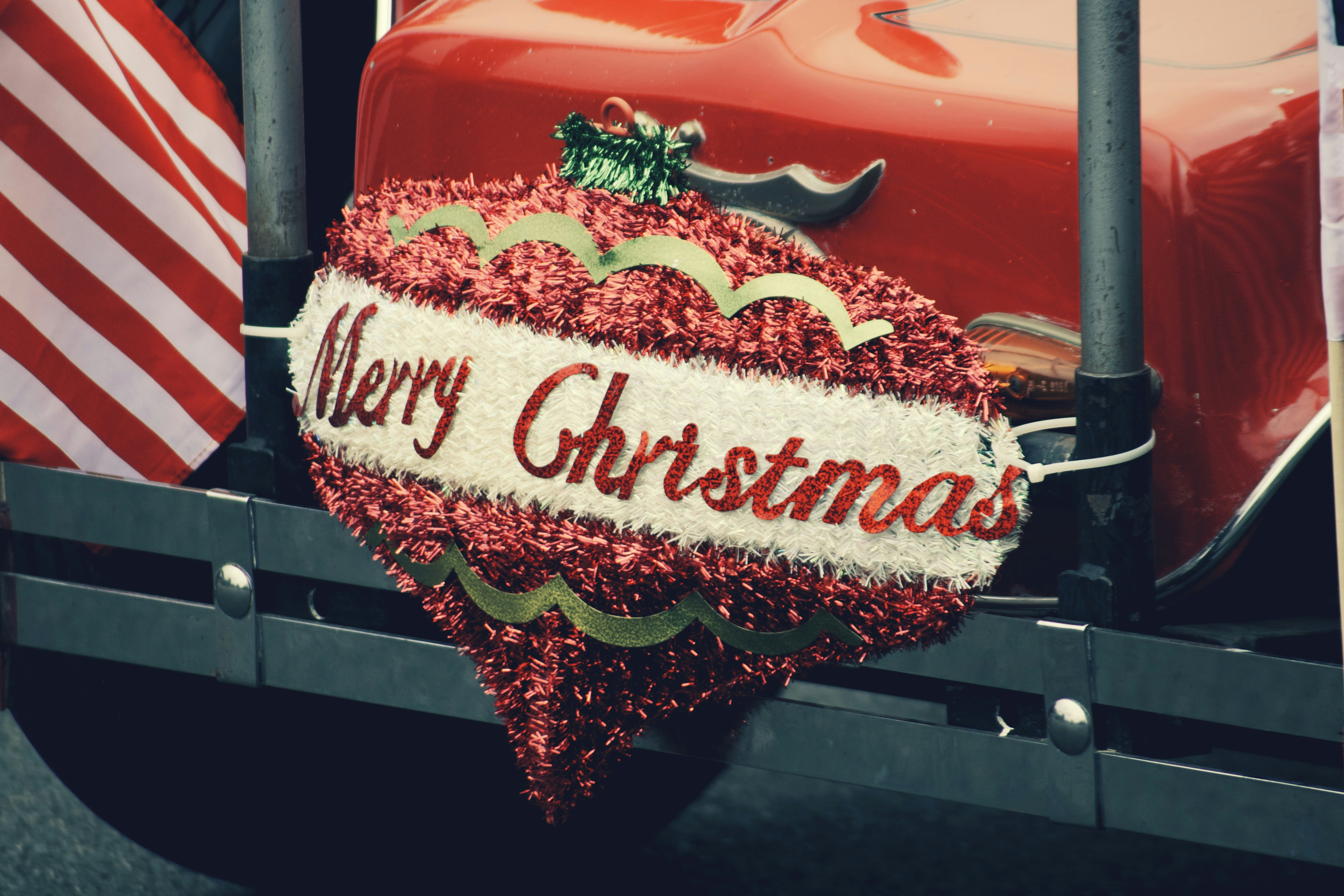 Tinsel Heart Adorning a Red Truck at Christmas Parade