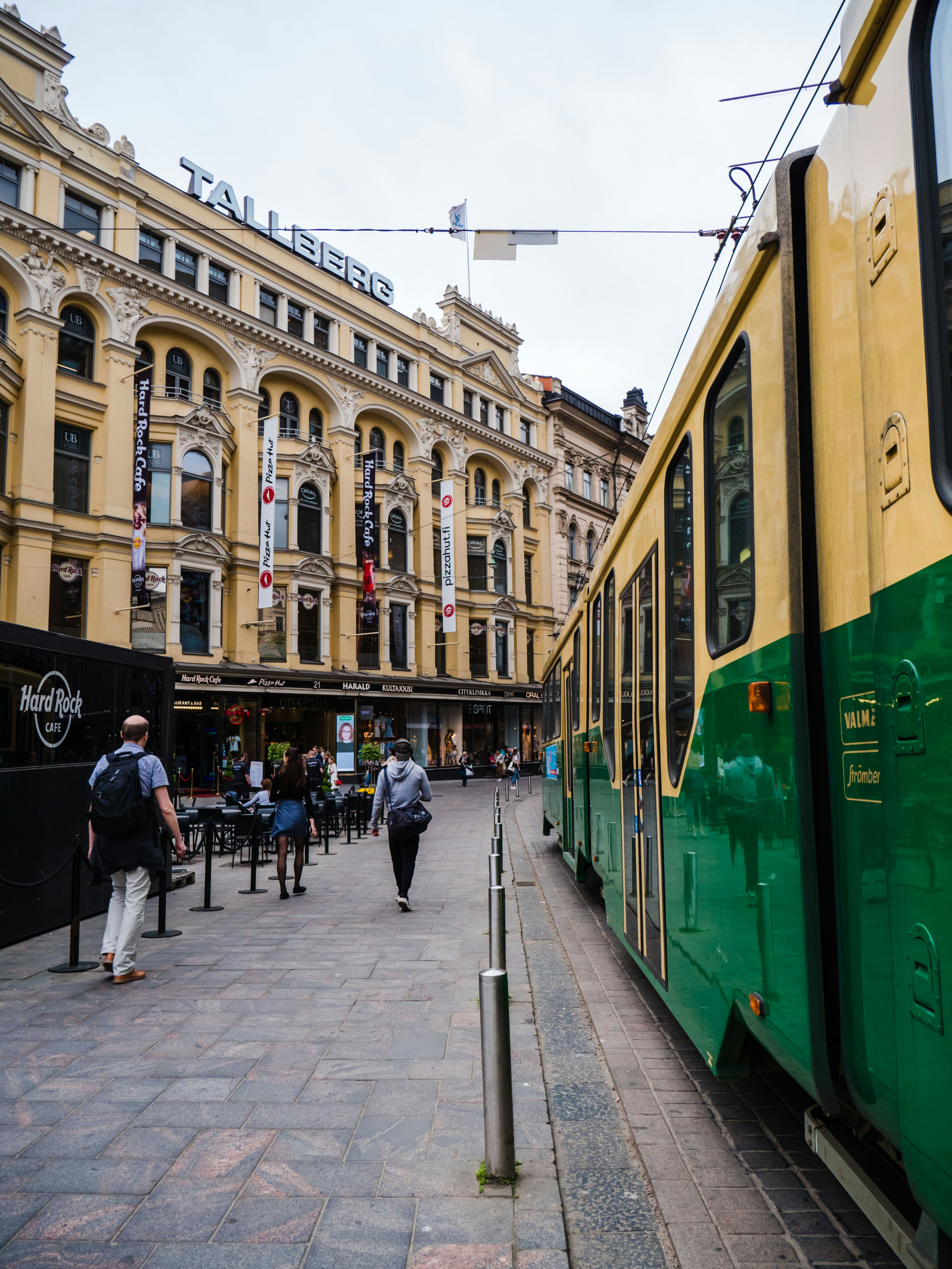 Tramline Through Time: A Sunlit Street of Arches and Rails