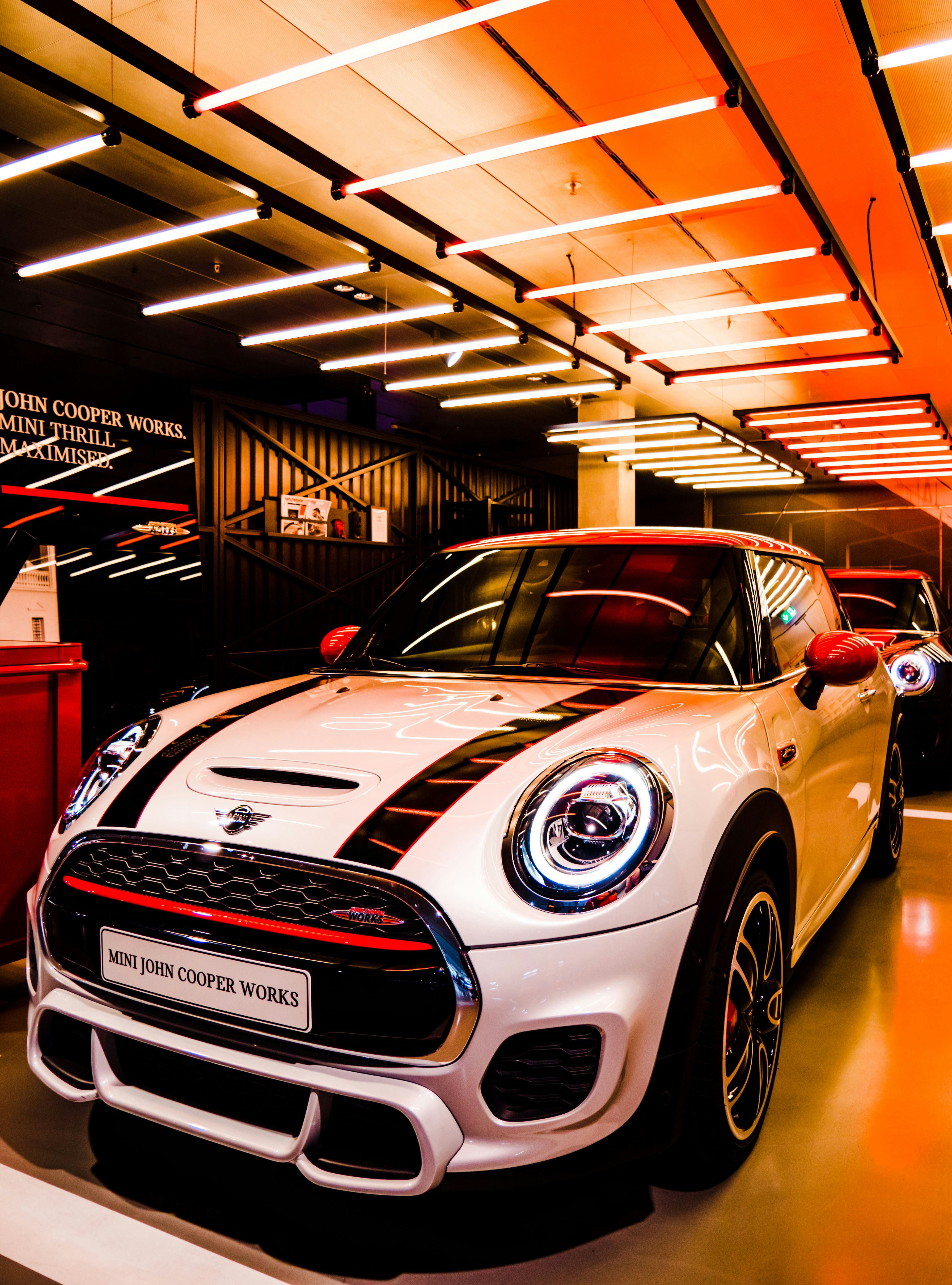White vehicle park inside building photo – Free Germany Image on Unsplash