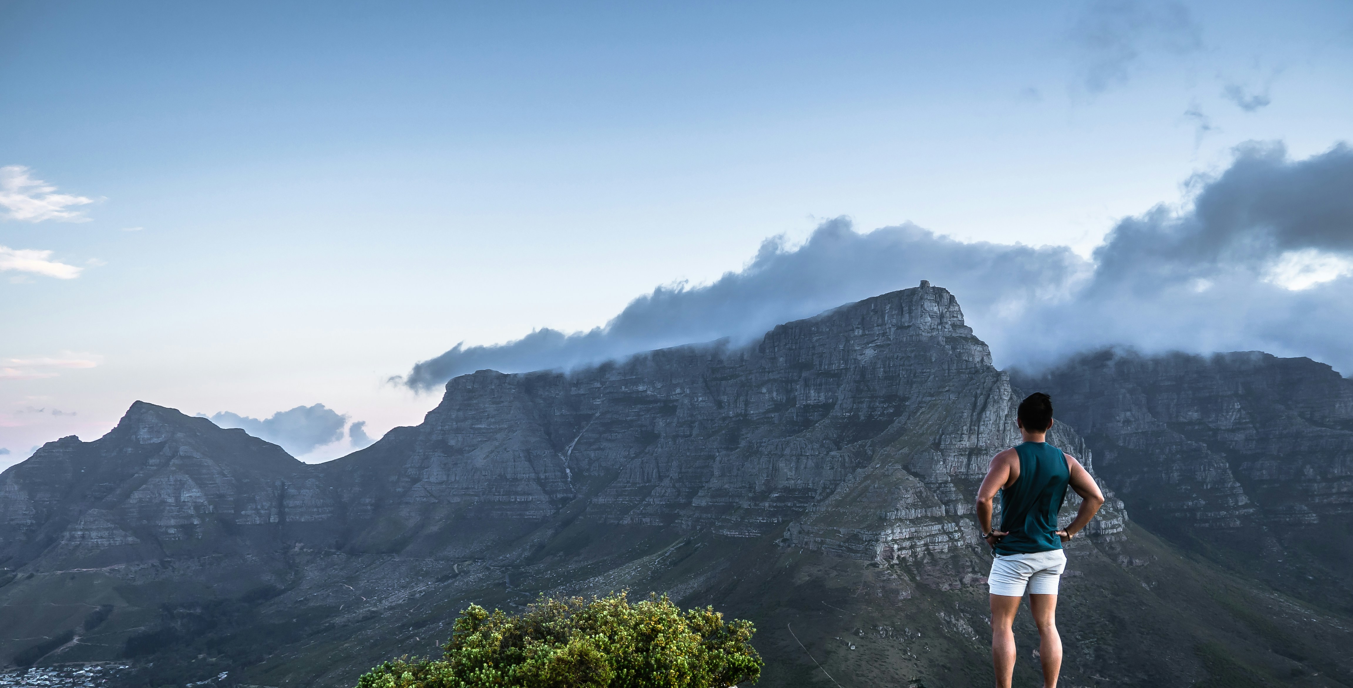 Man standing on cliff photo – Free Cape town Image on Unsplash