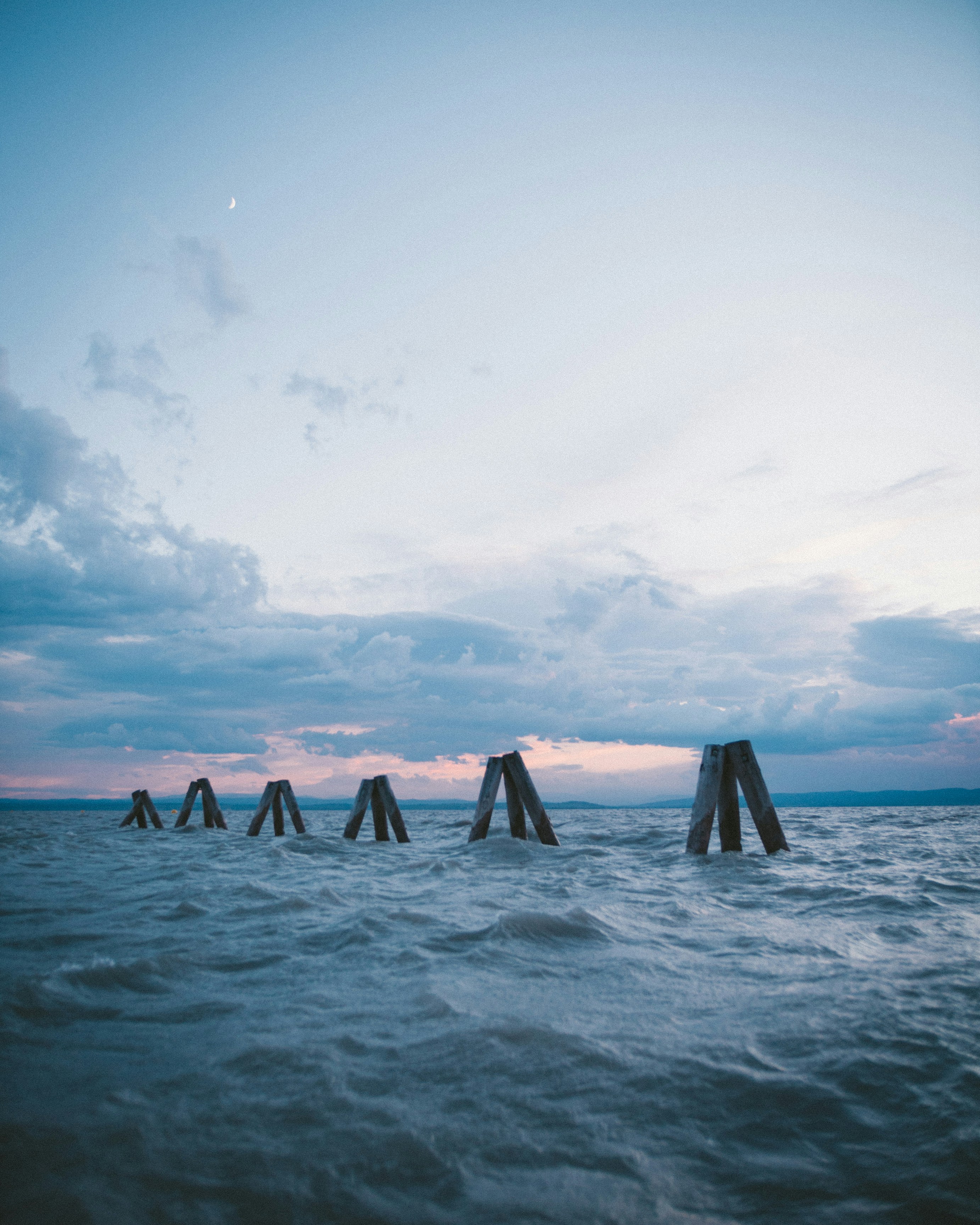 Wooden structures on beach photo – Free Grey Image on Unsplash
