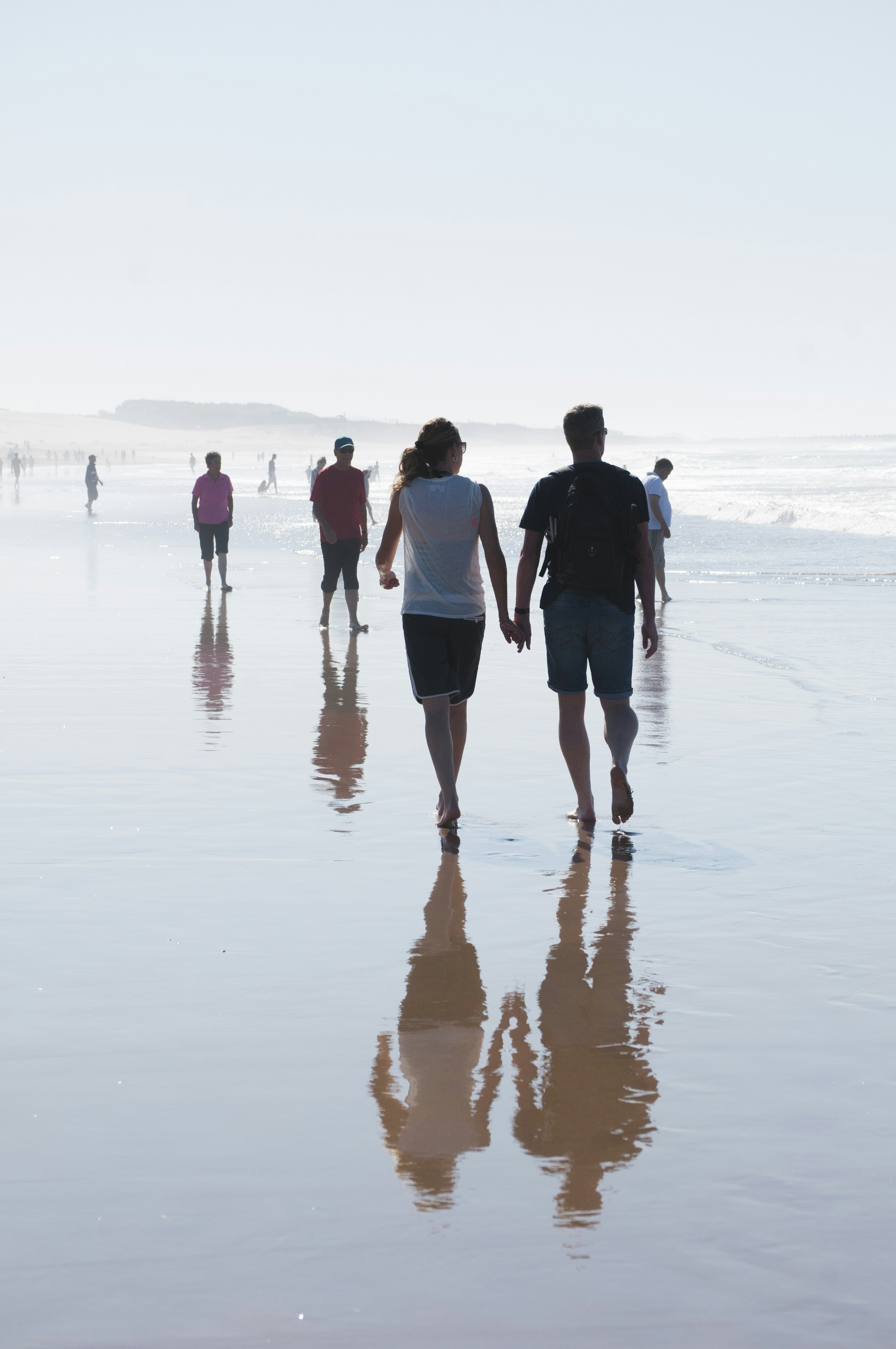 People walking on beach photo – Free Travel Image on Unsplash