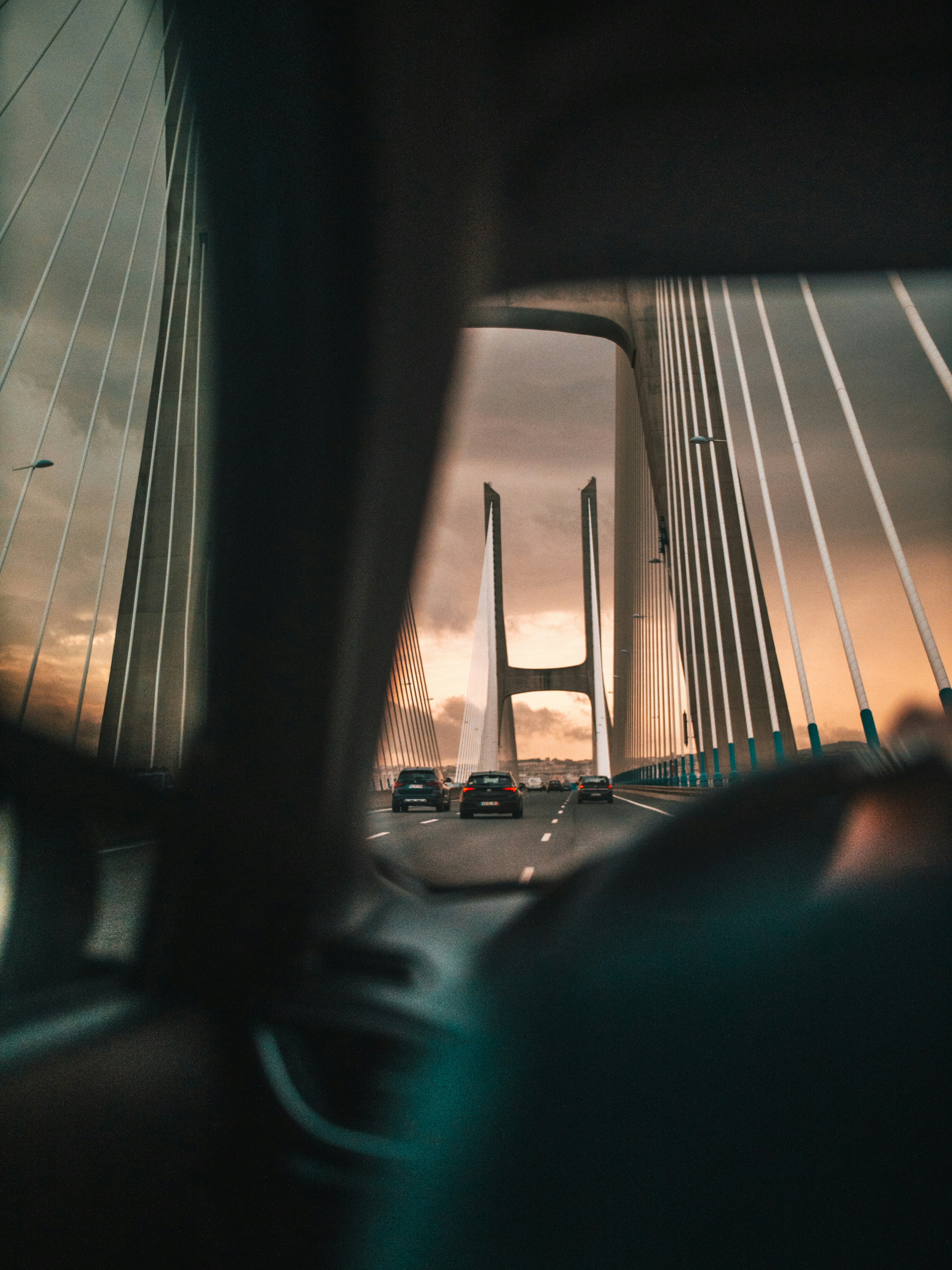 Vehicles on bridge photo – Free Brown Image on Unsplash