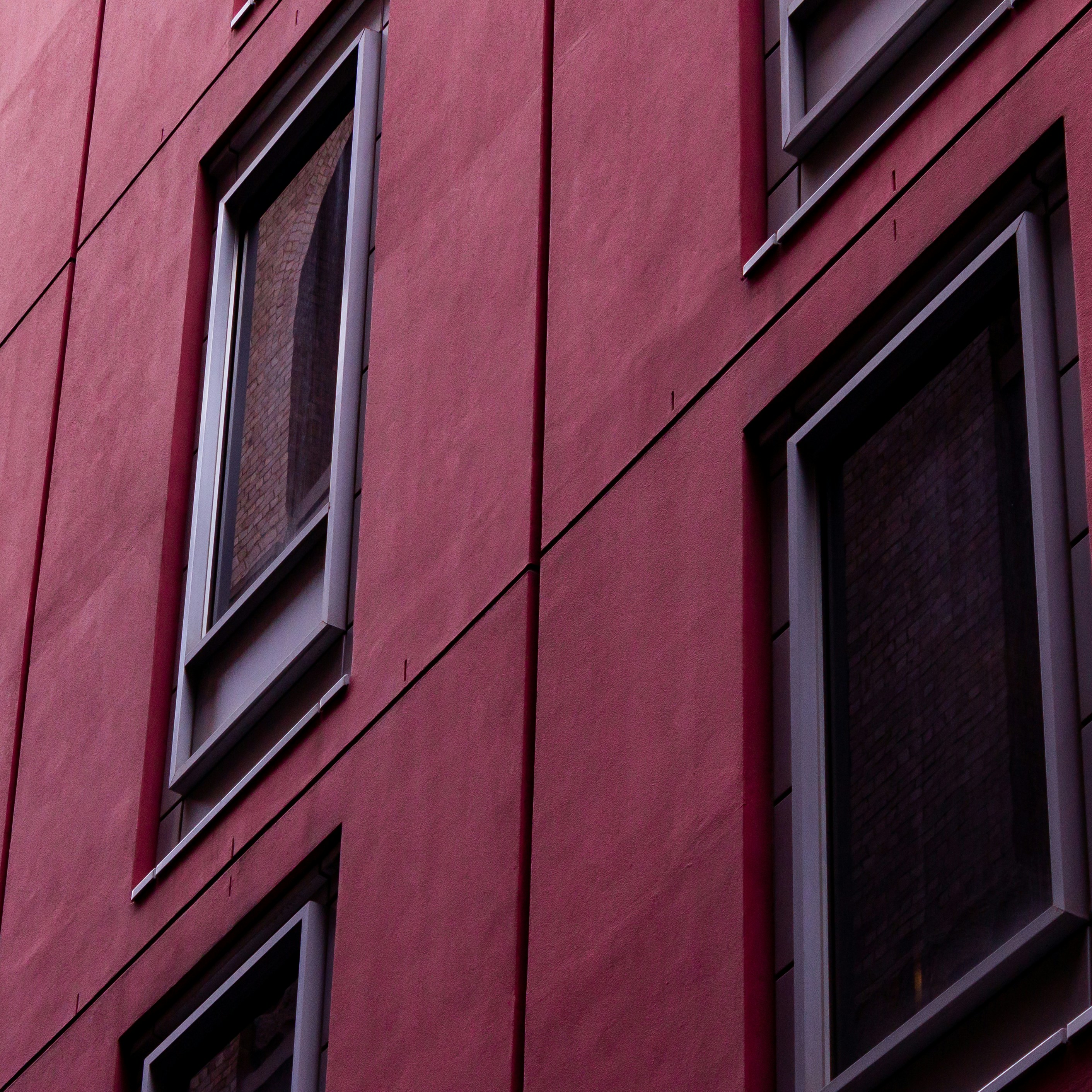 Red concrete building photo – Free Street photography Image on Unsplash