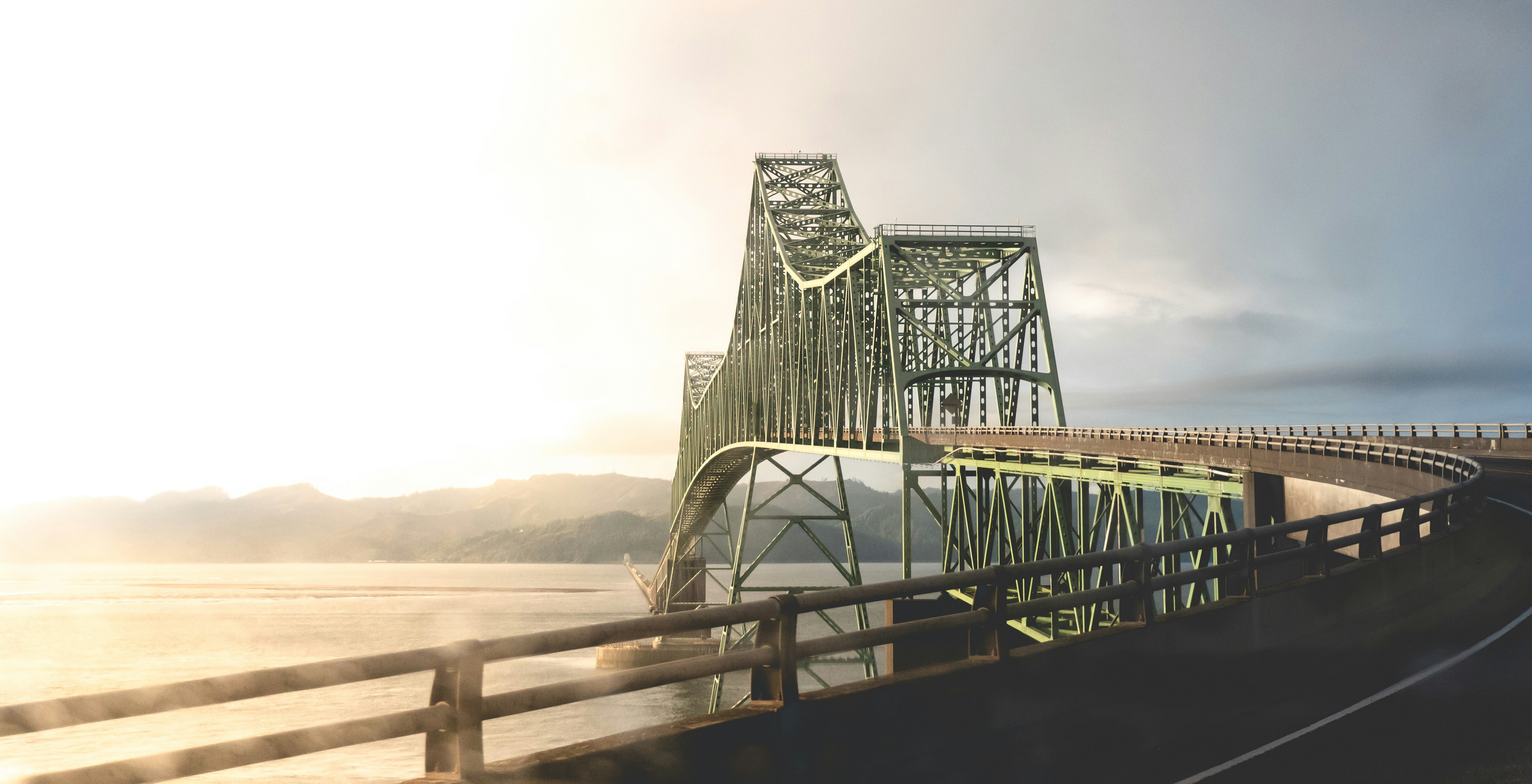 Mist, Metal, and Morning Light: A Truss Bridge Over Quiet Water