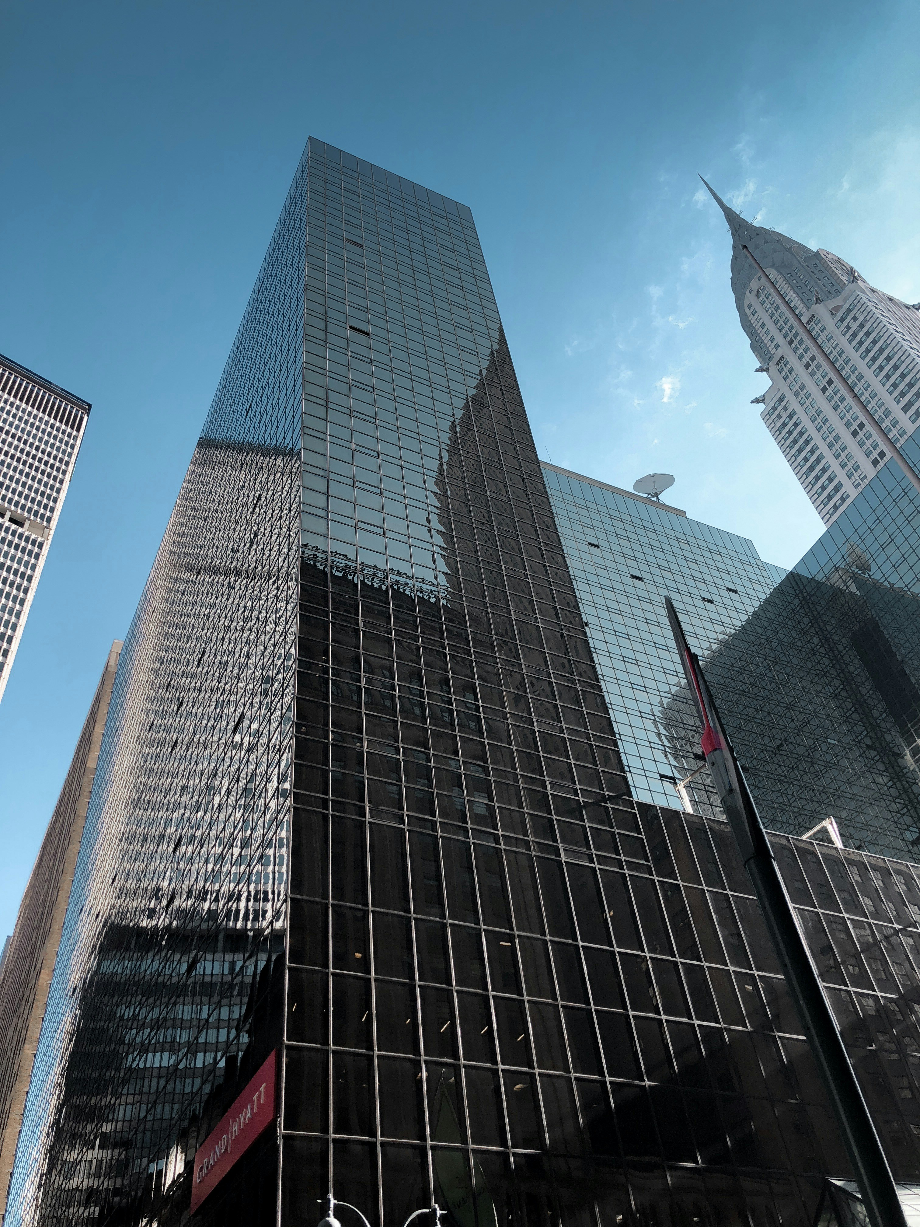 Glass and Steel Canyon: Skyscrapers Reflect the Sky