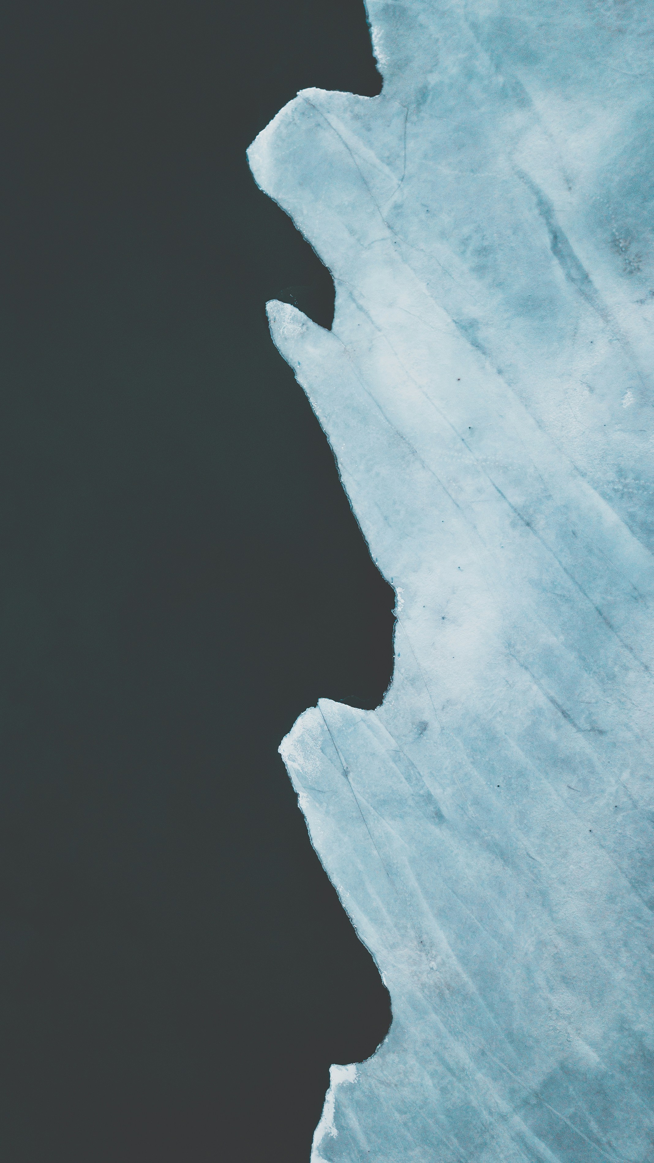 Edge of Silence: Vertical Boundary Between Ice and Shadow