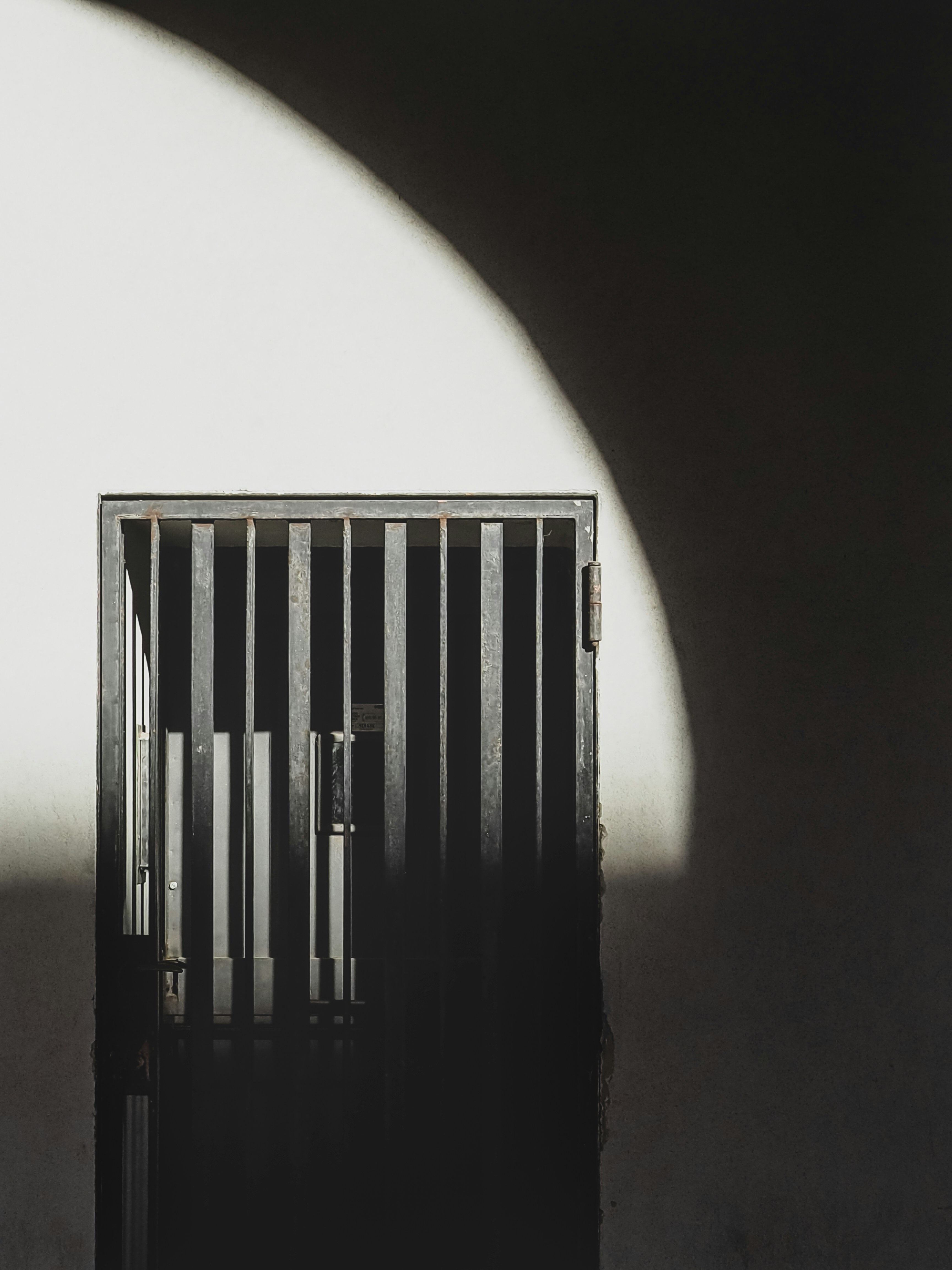 A black and white photo of a jail cell photo – Free Grey Image on Unsplash