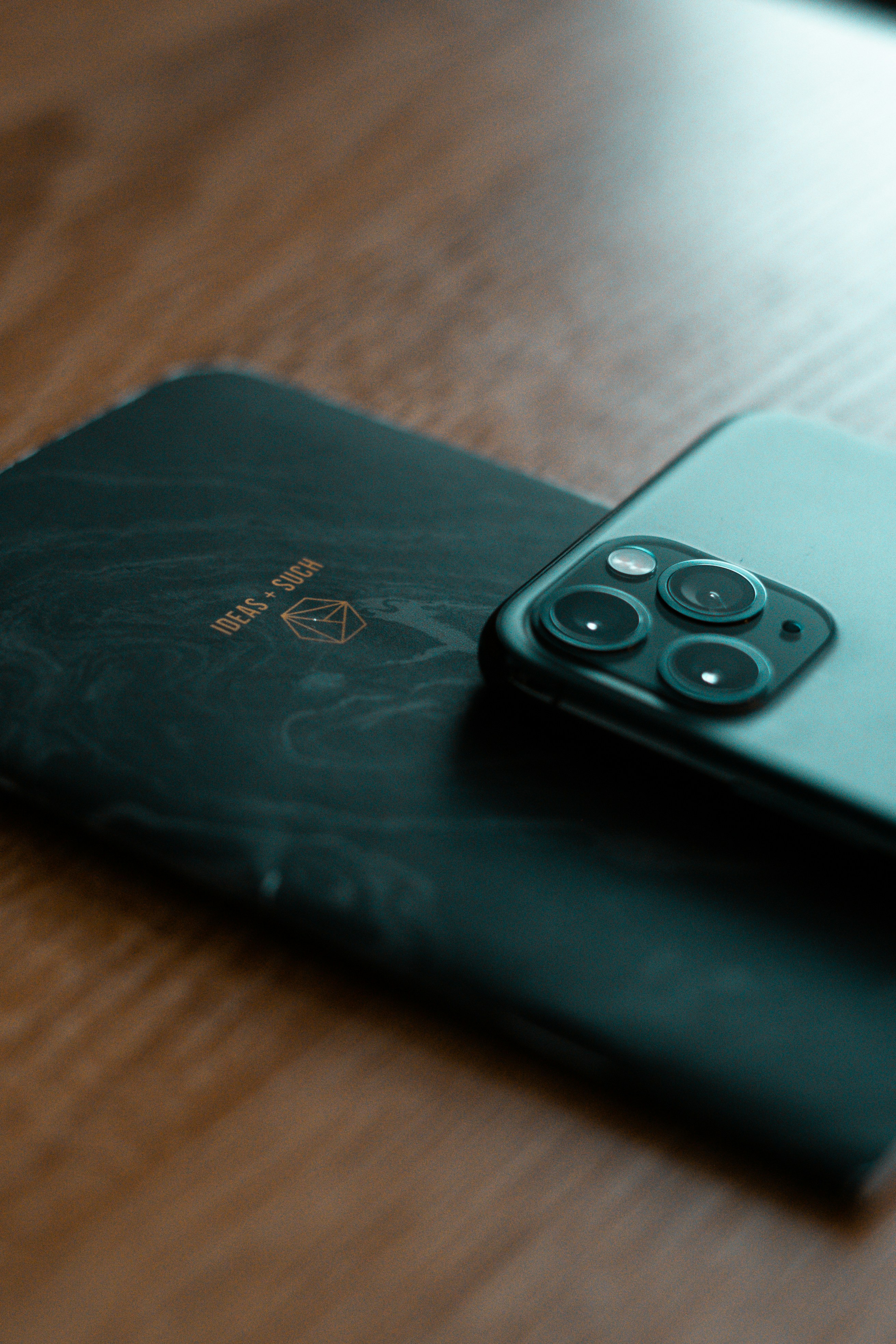 Still Life with Tech: A Dark Matte Case and Lensed Glow