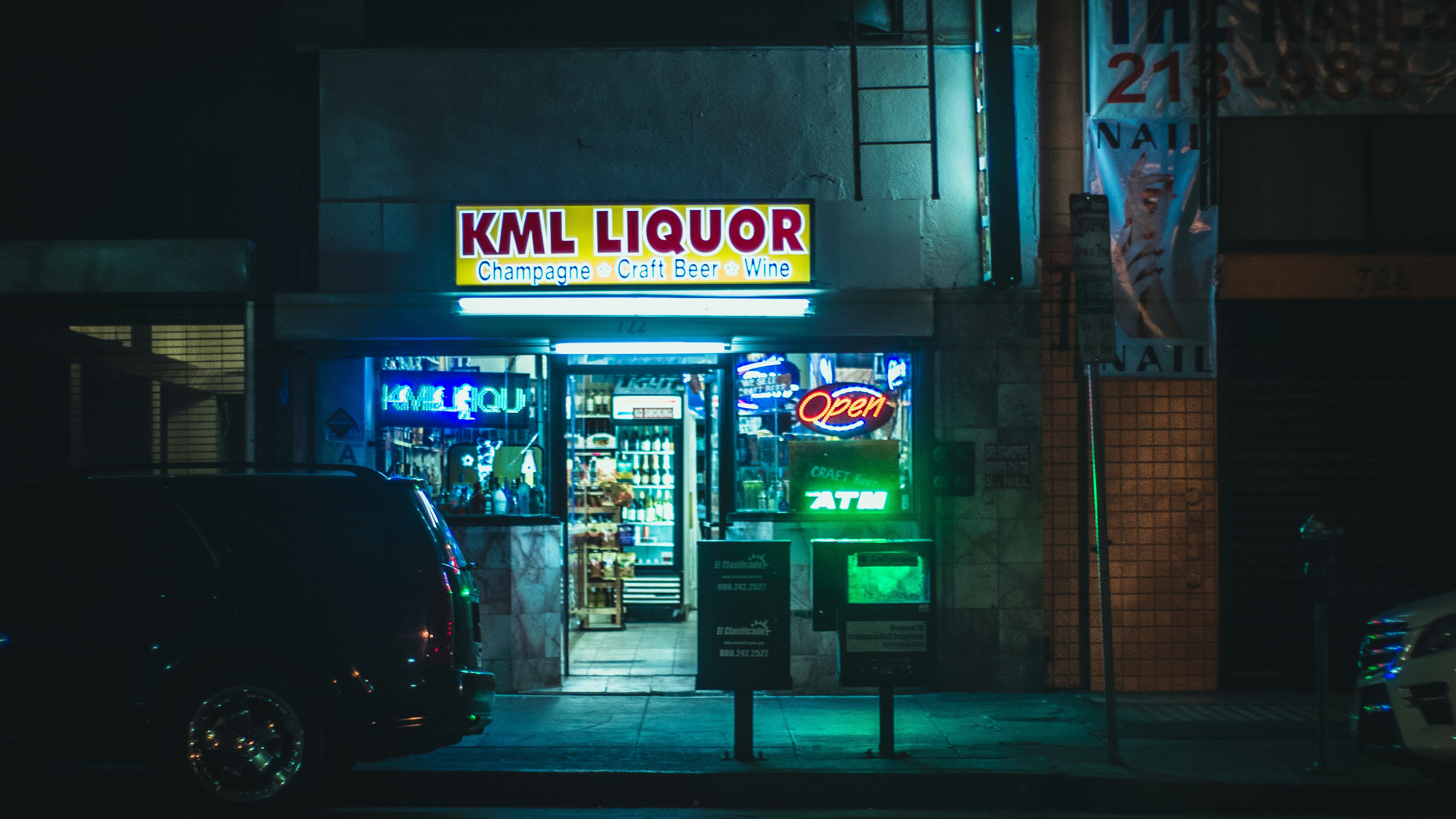 KML Liquor store during nighttime