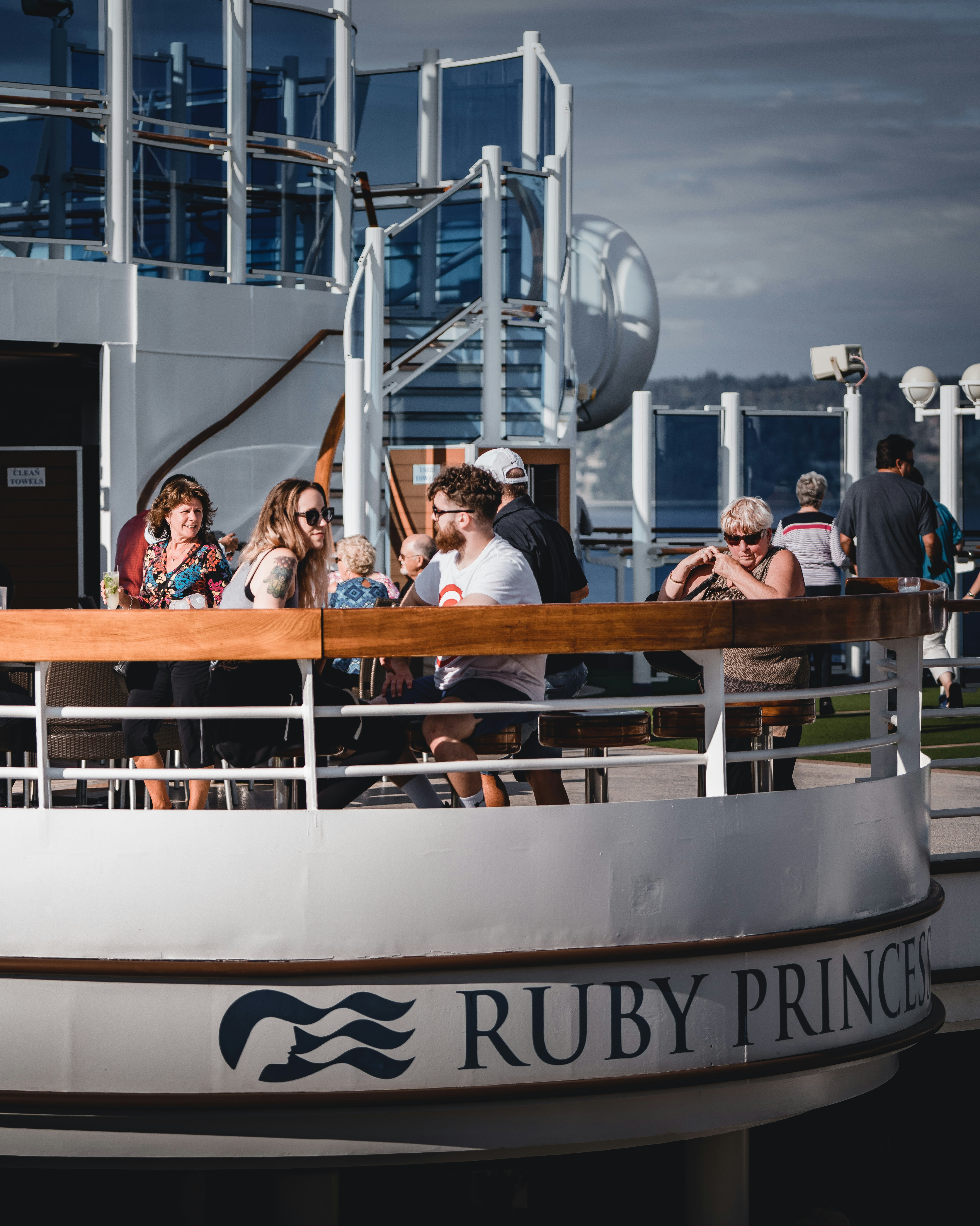 Couple sitting on the Ruby Princess ship photo – Free Human Image on Unsplash