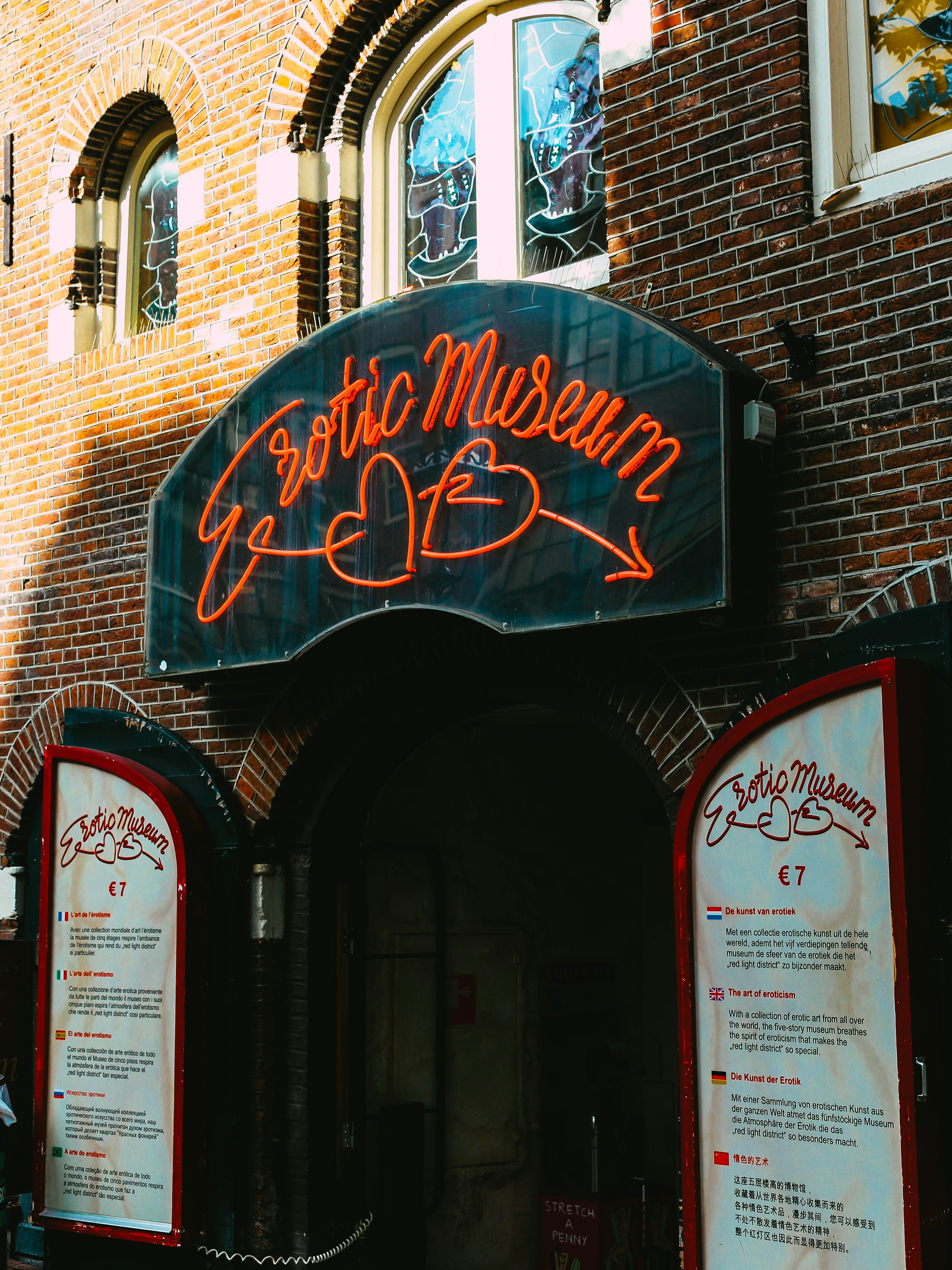Neon Heart Above Brick Archway: Entrance to the Erotic Museum