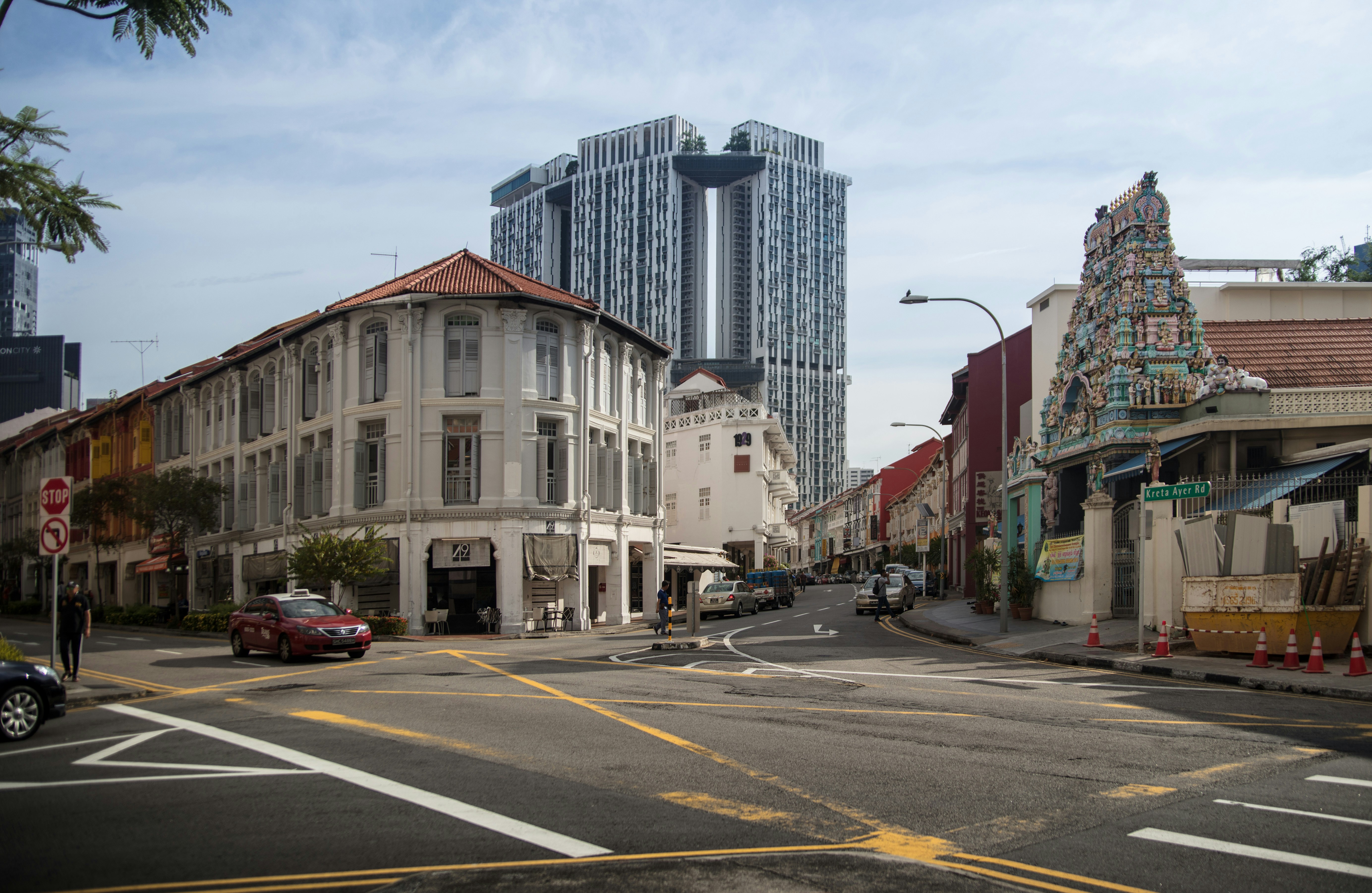 Crossroads of History: A Street's Quiet Confrontation with Skyscrapers
