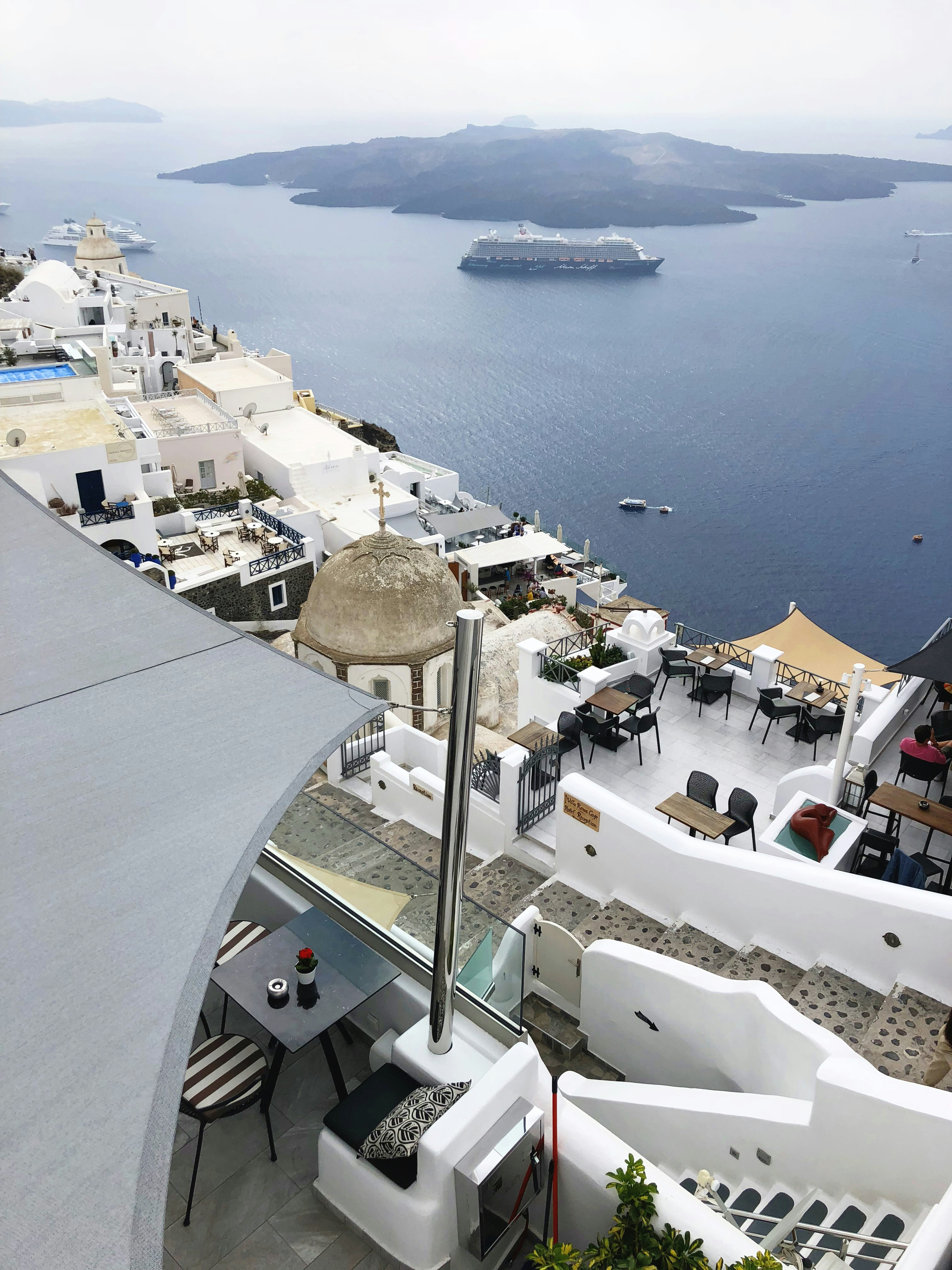 aerial photography of seaside resort viewing island during daytime