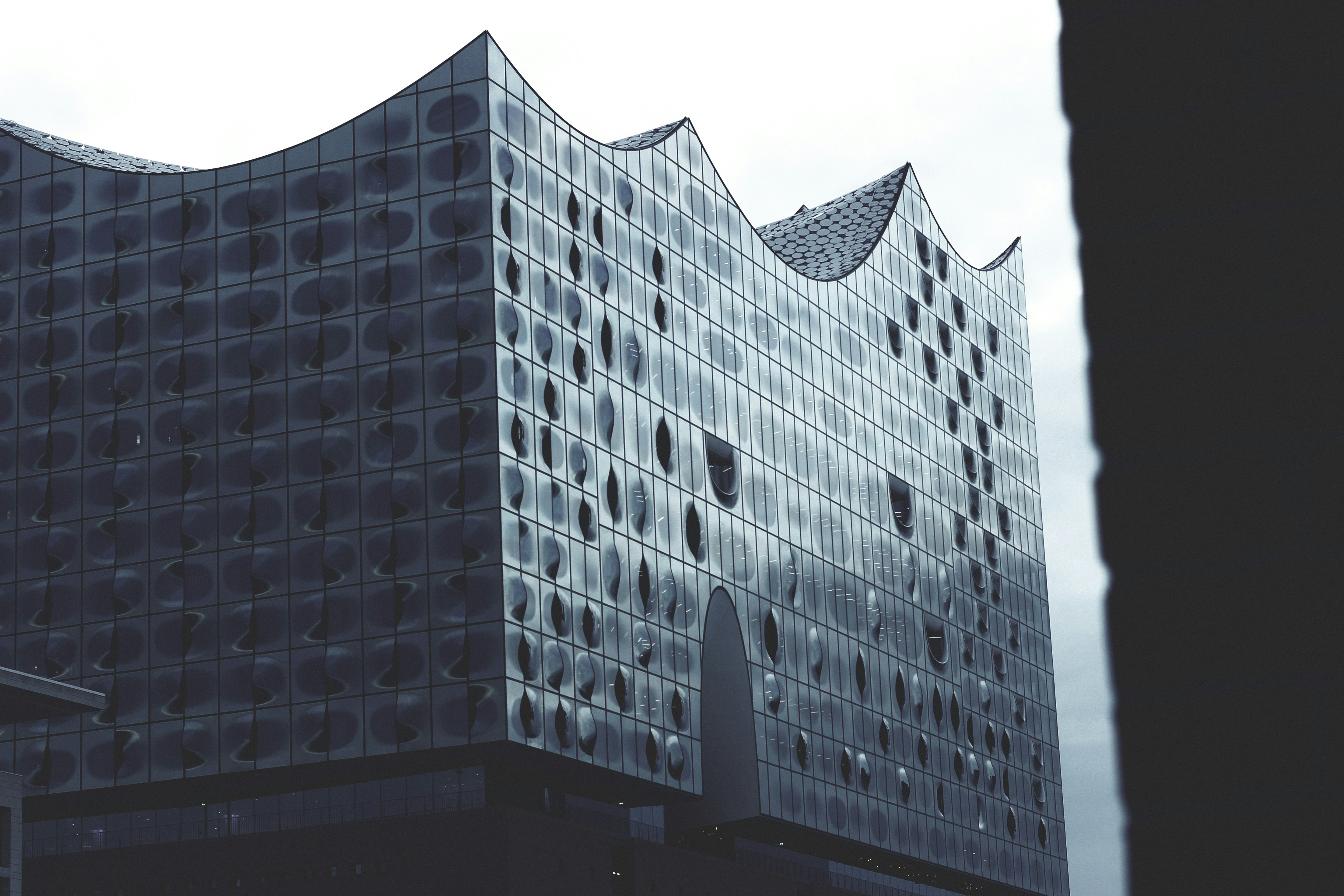 The Wave of Metal: Circular Echoes on a Modern Facade