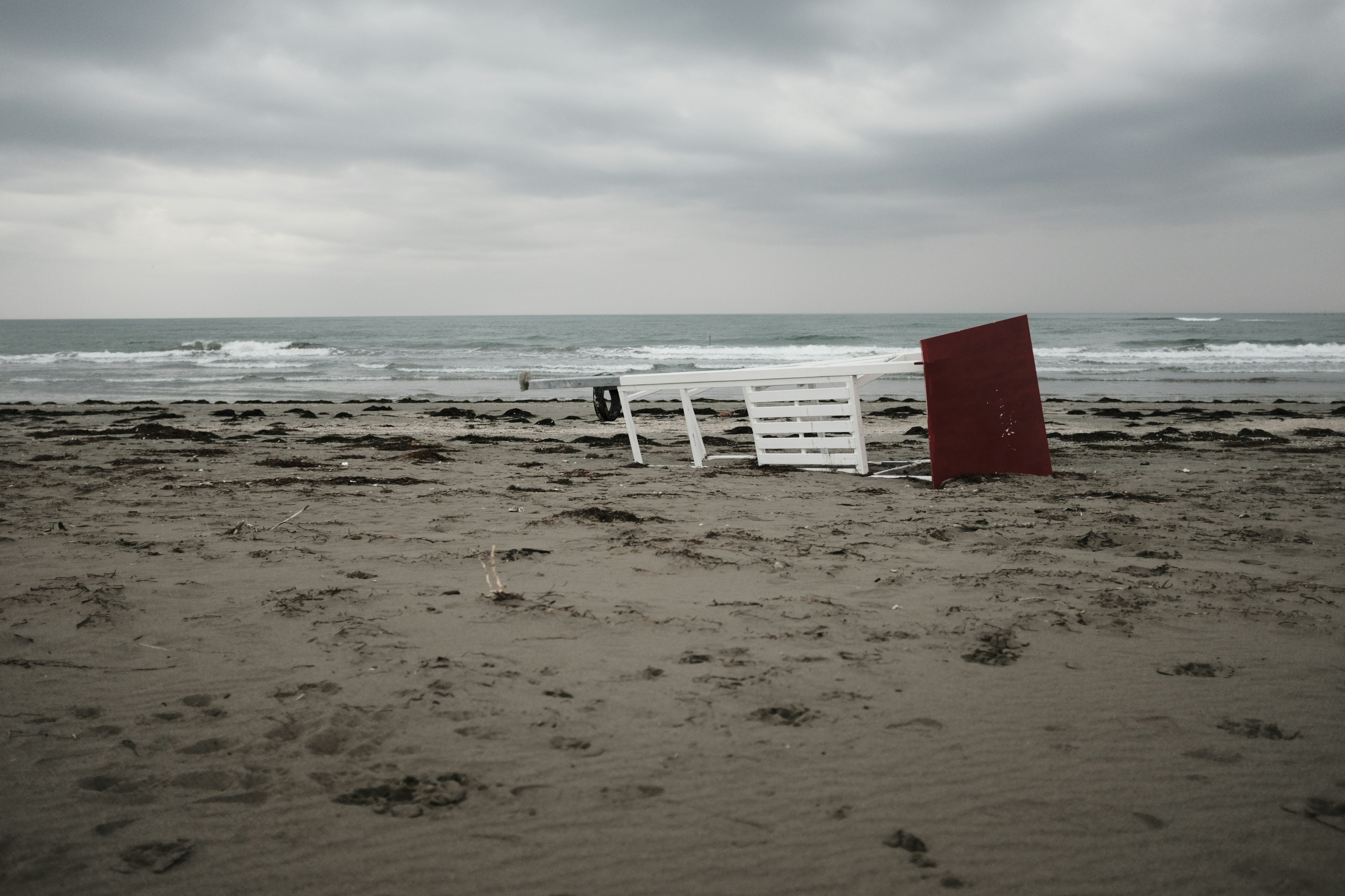 White wooden table near seashore under white and gray sky photo – Free ...