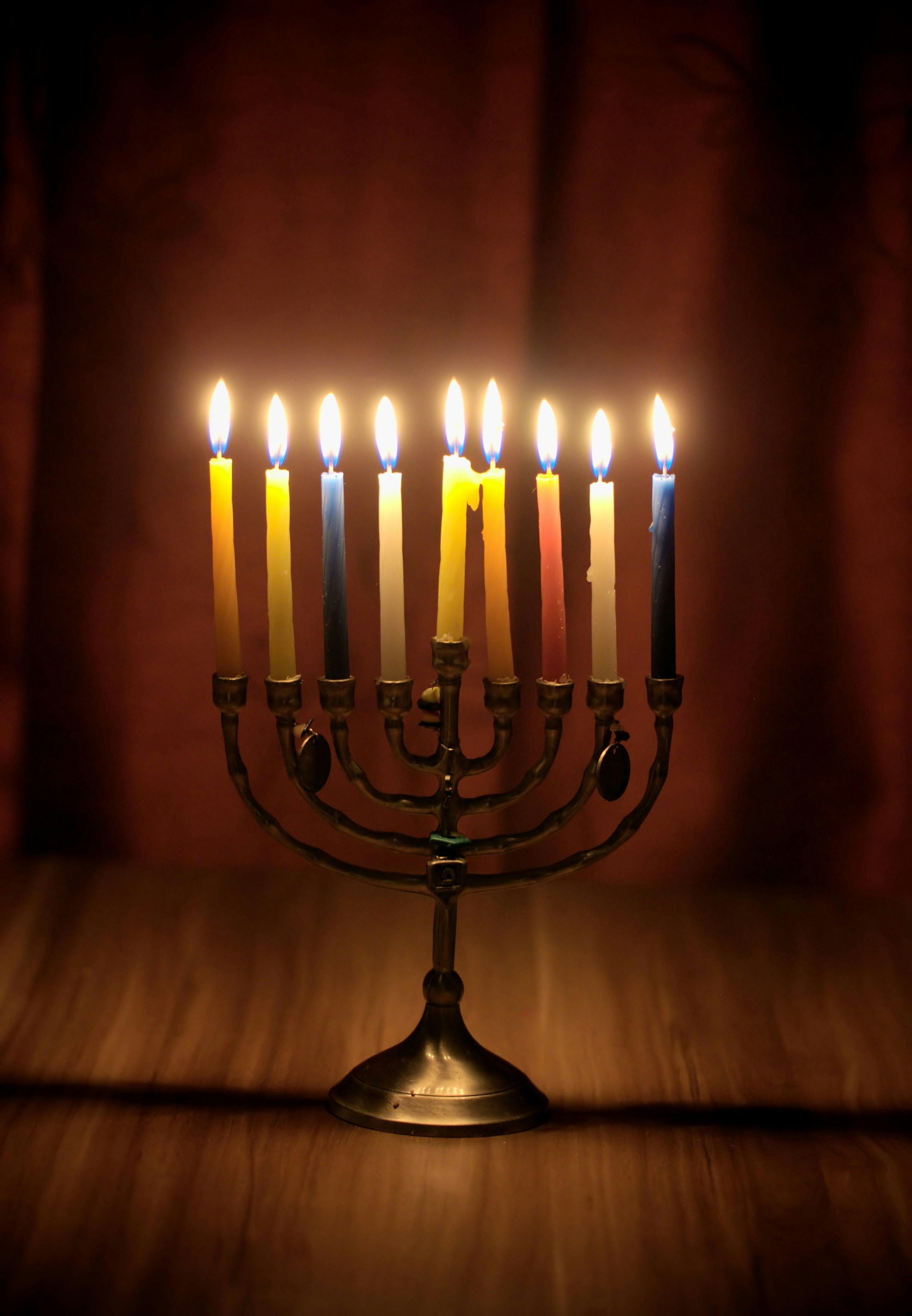Centered Glow: Nine-Candle Menorah in Quiet Light