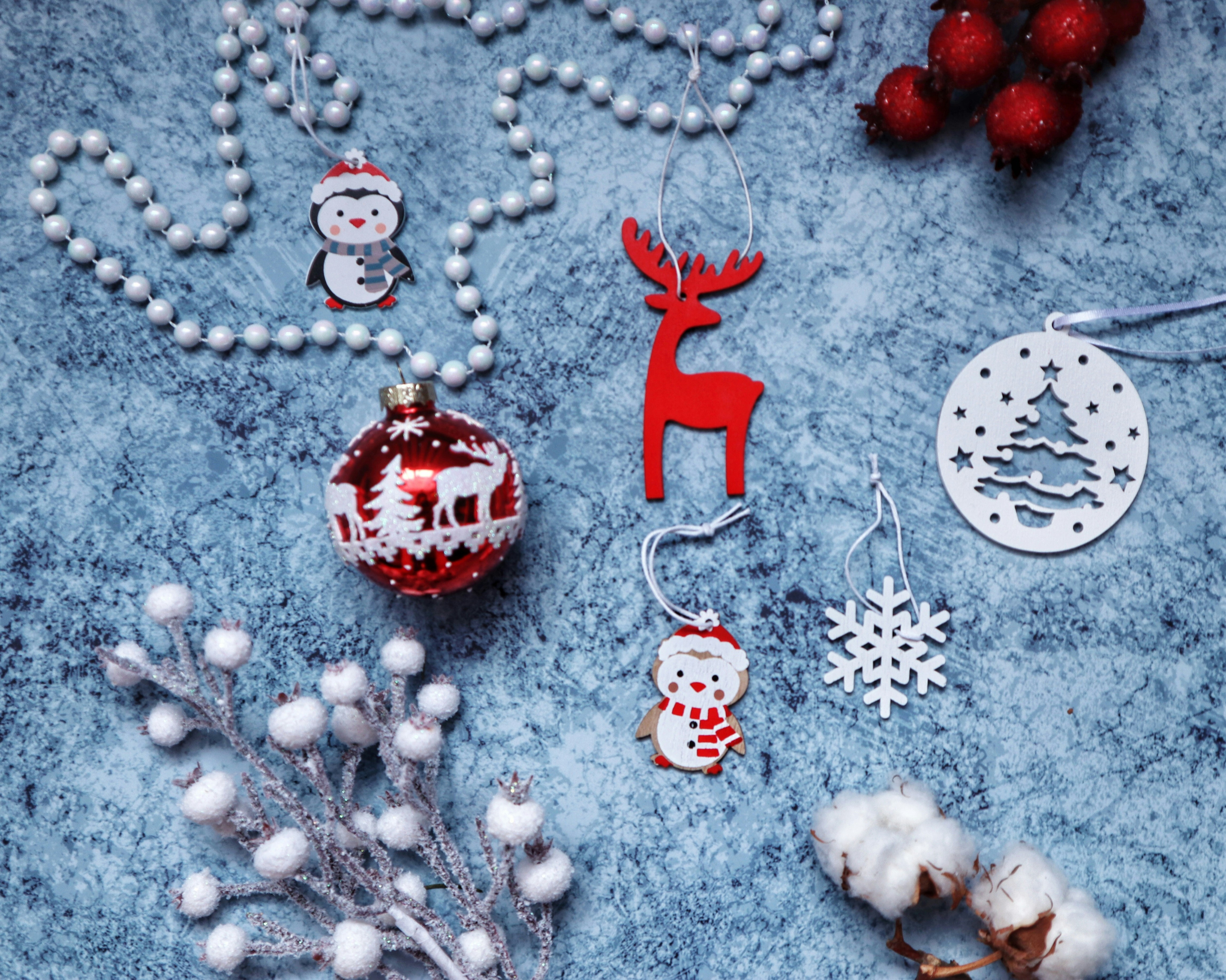 Red Reindeer Pendant Anchors a Frosted Holiday Montage