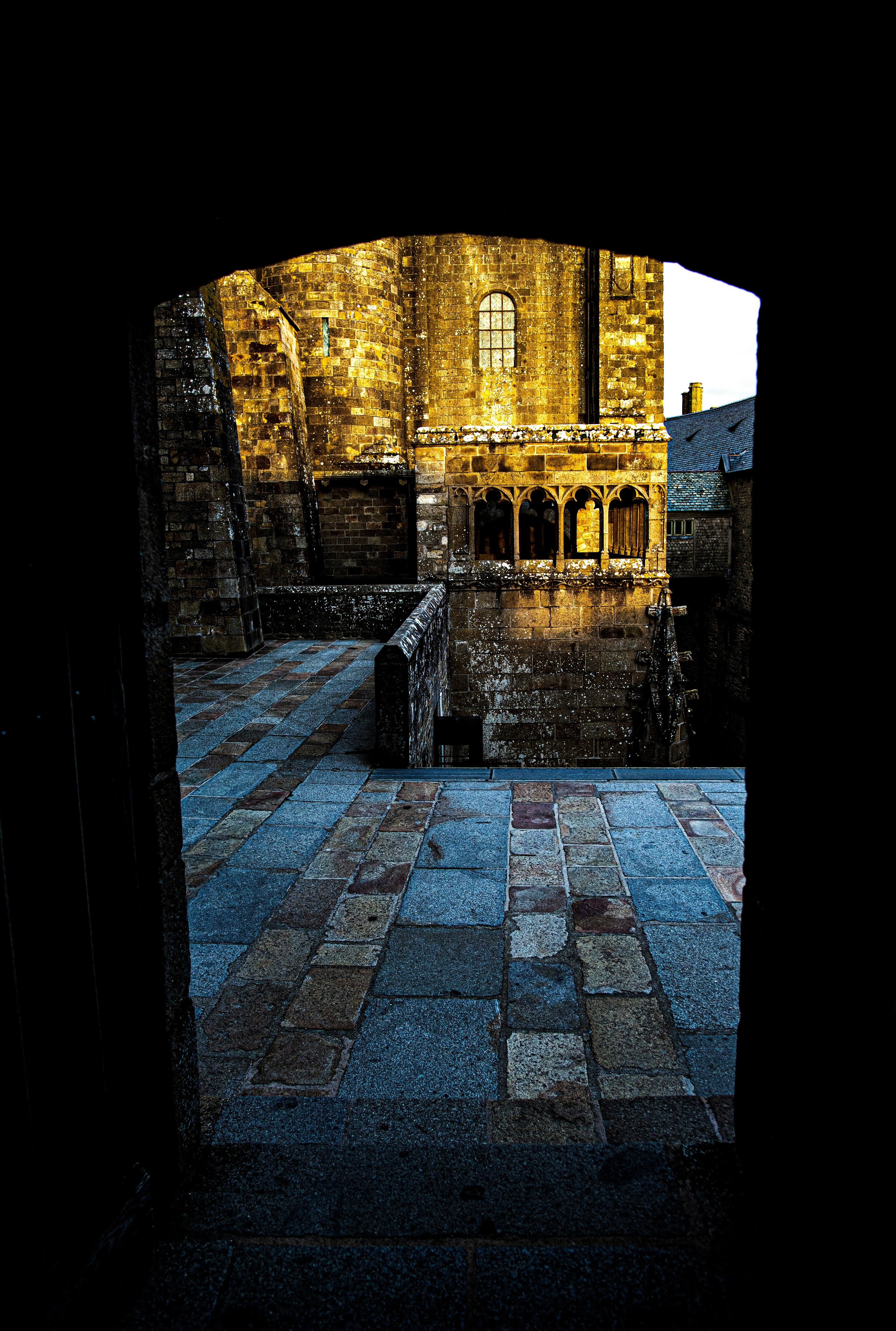 Sunlit Architecture Through the Archway