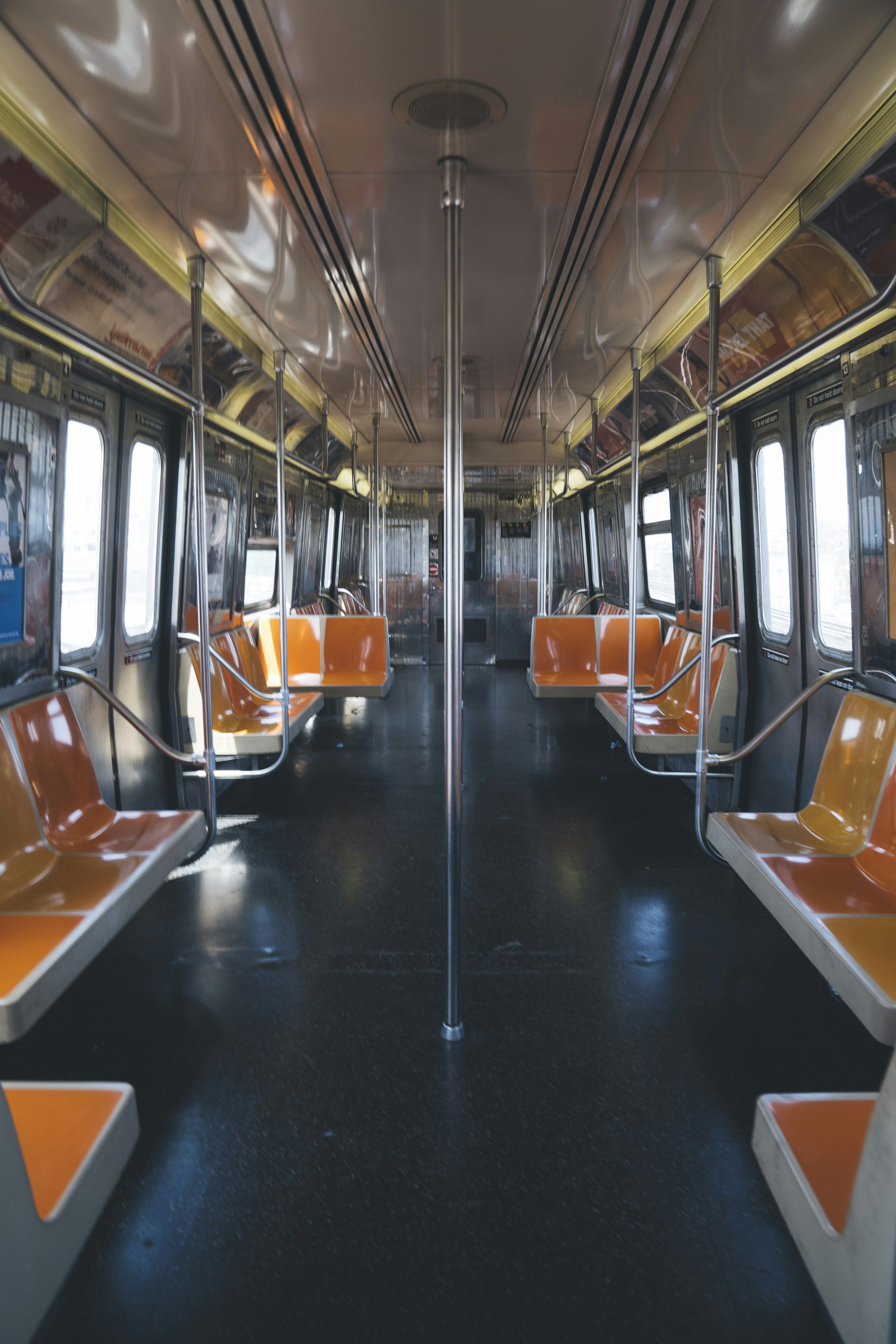 An empty train car with orange seats photo – Free Usa Image on Unsplash
