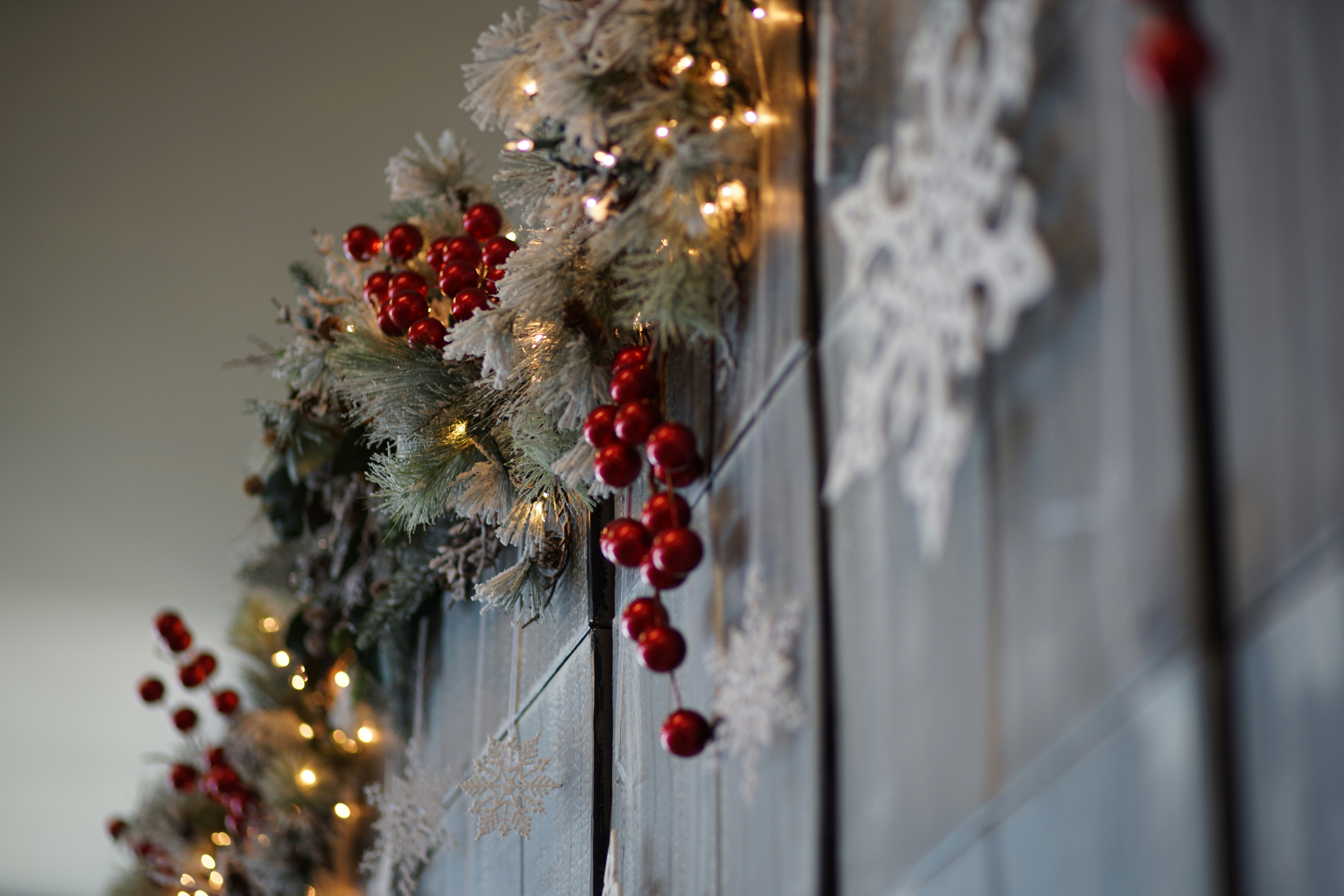 Twilight Berries: Fairy-Lit Garland Framing Weathered Wood