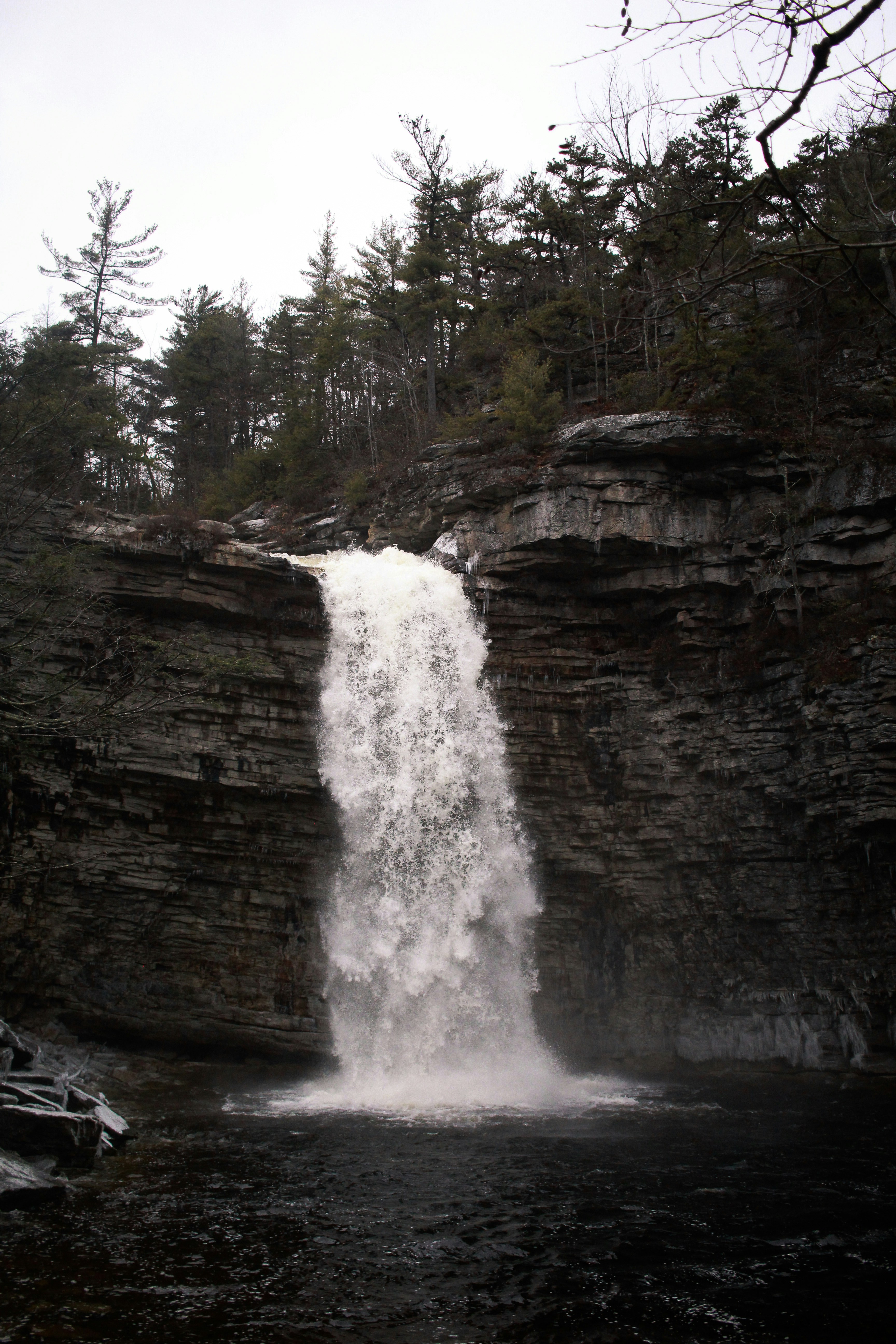 Edge of Silence: A Waterfall Between Granite Ridges