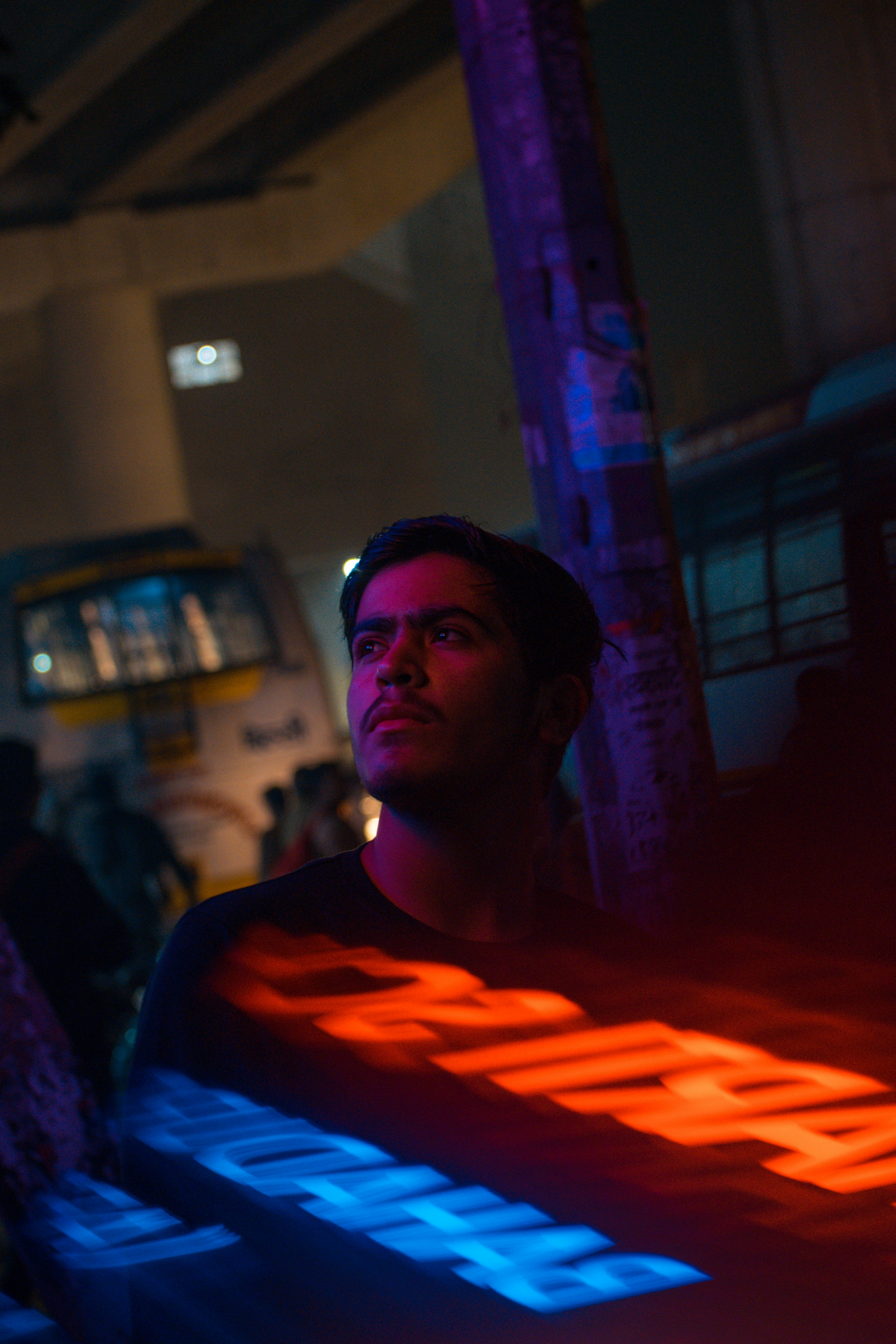 Glimmered Gaze Beneath Neon Graffiti