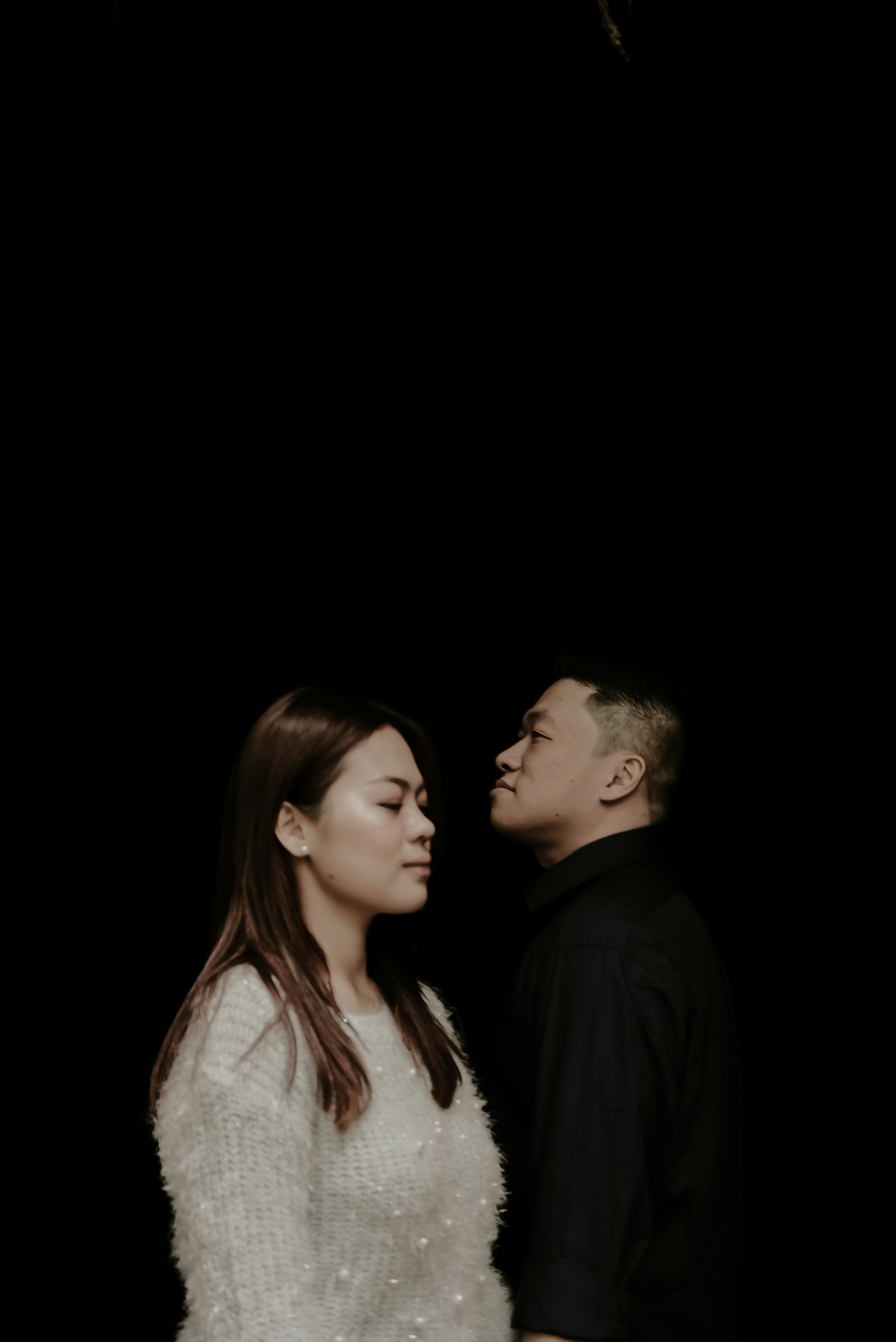 Man and woman inside dim room photo – Free Black Image on Unsplash