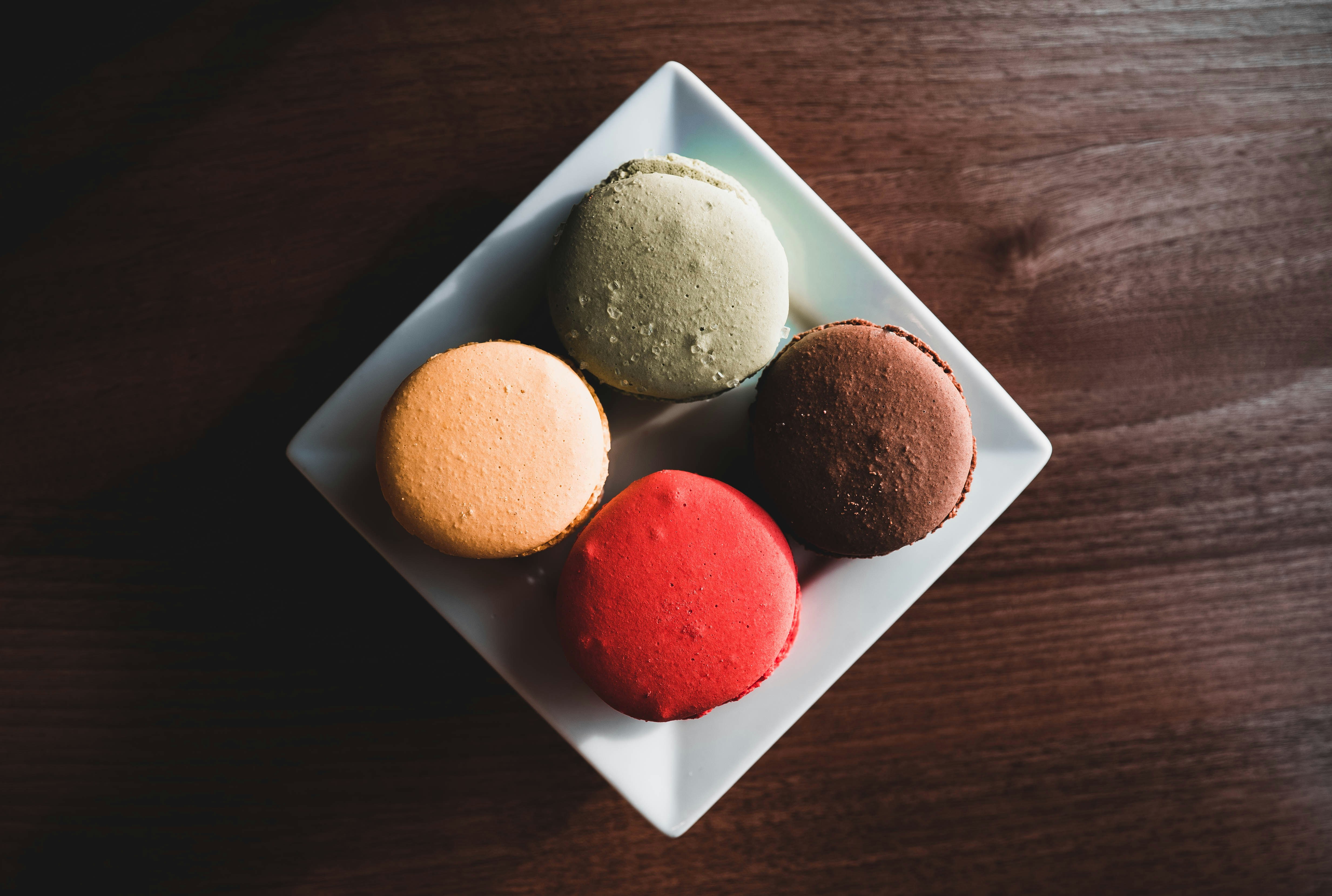 Four assorted-colored French macarons photo – Free Canada Image on Unsplash
