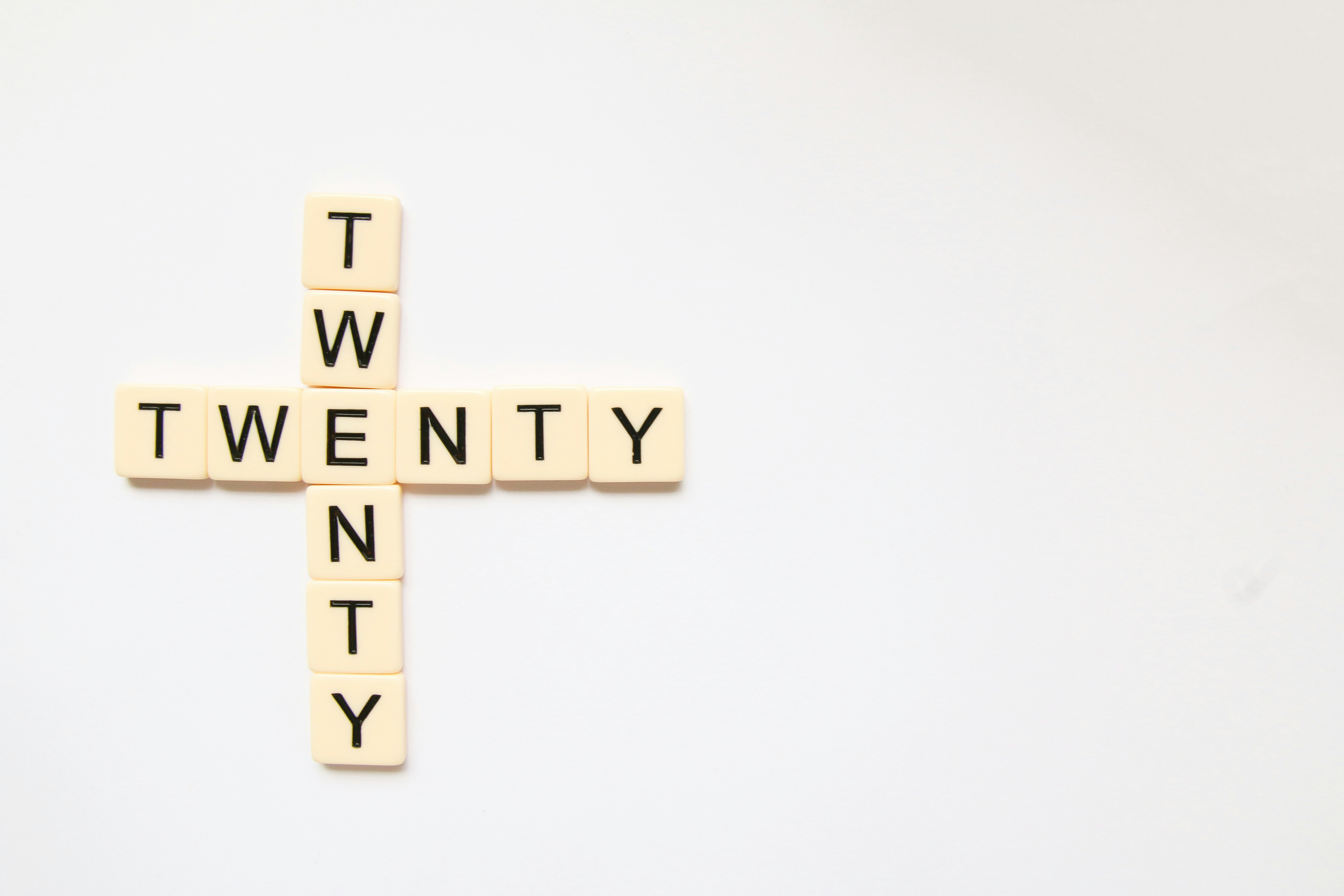 Twenty Cross: A Minimalist Tile Crossword on White