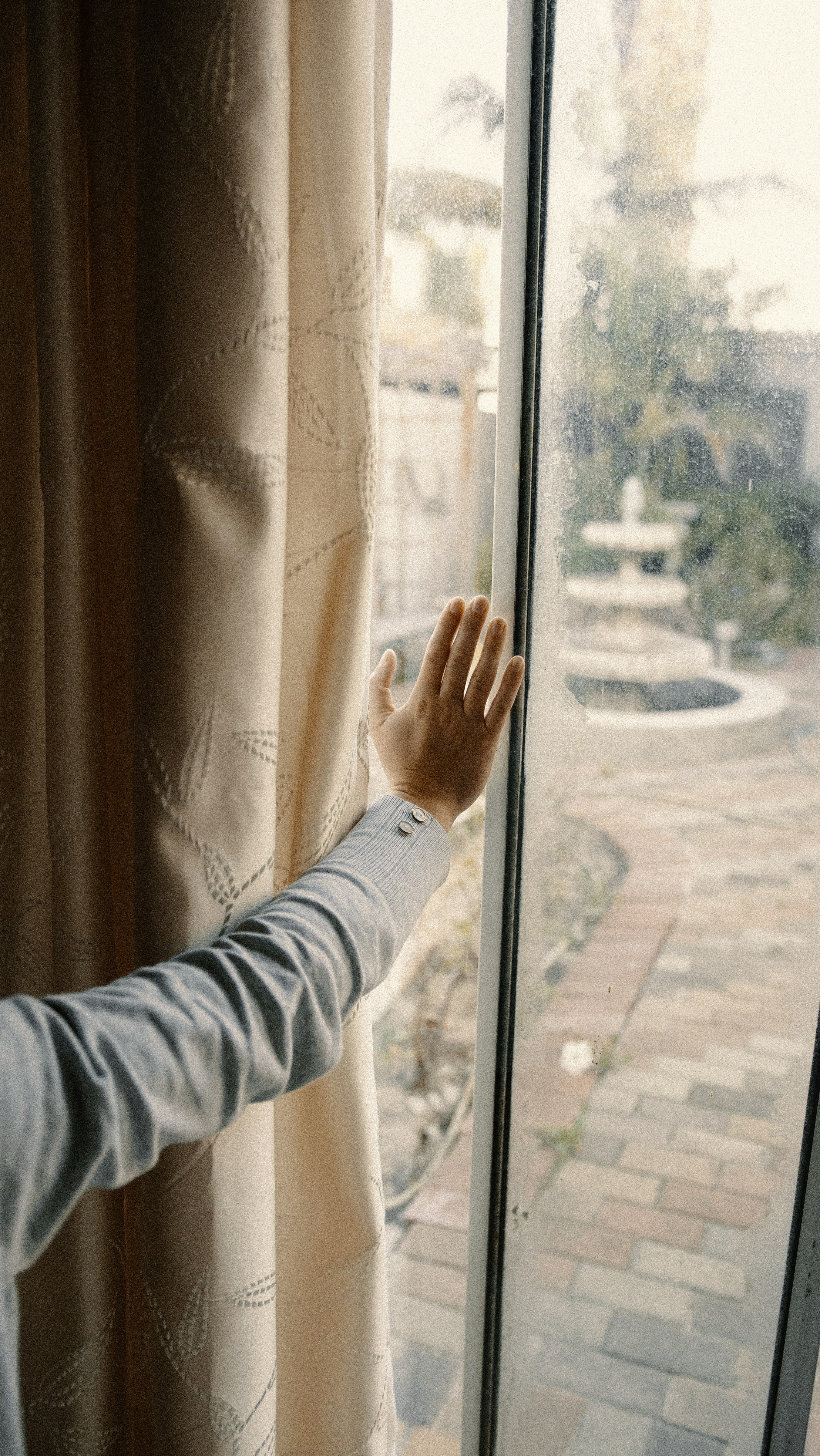 Person touching glass window photo – Free Human Image on Unsplash