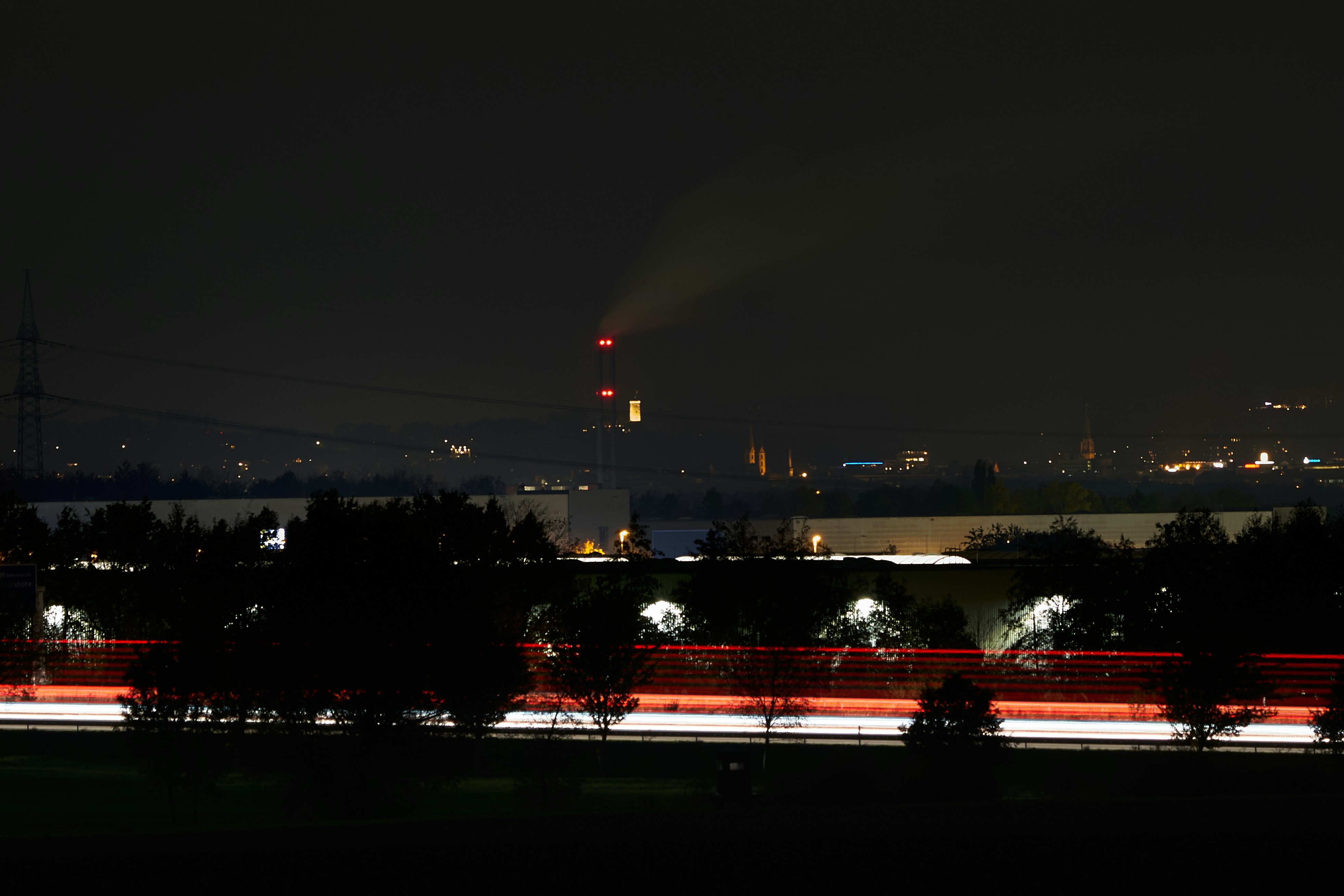 A view of a city at night from a distance photo – Free Architecture ...