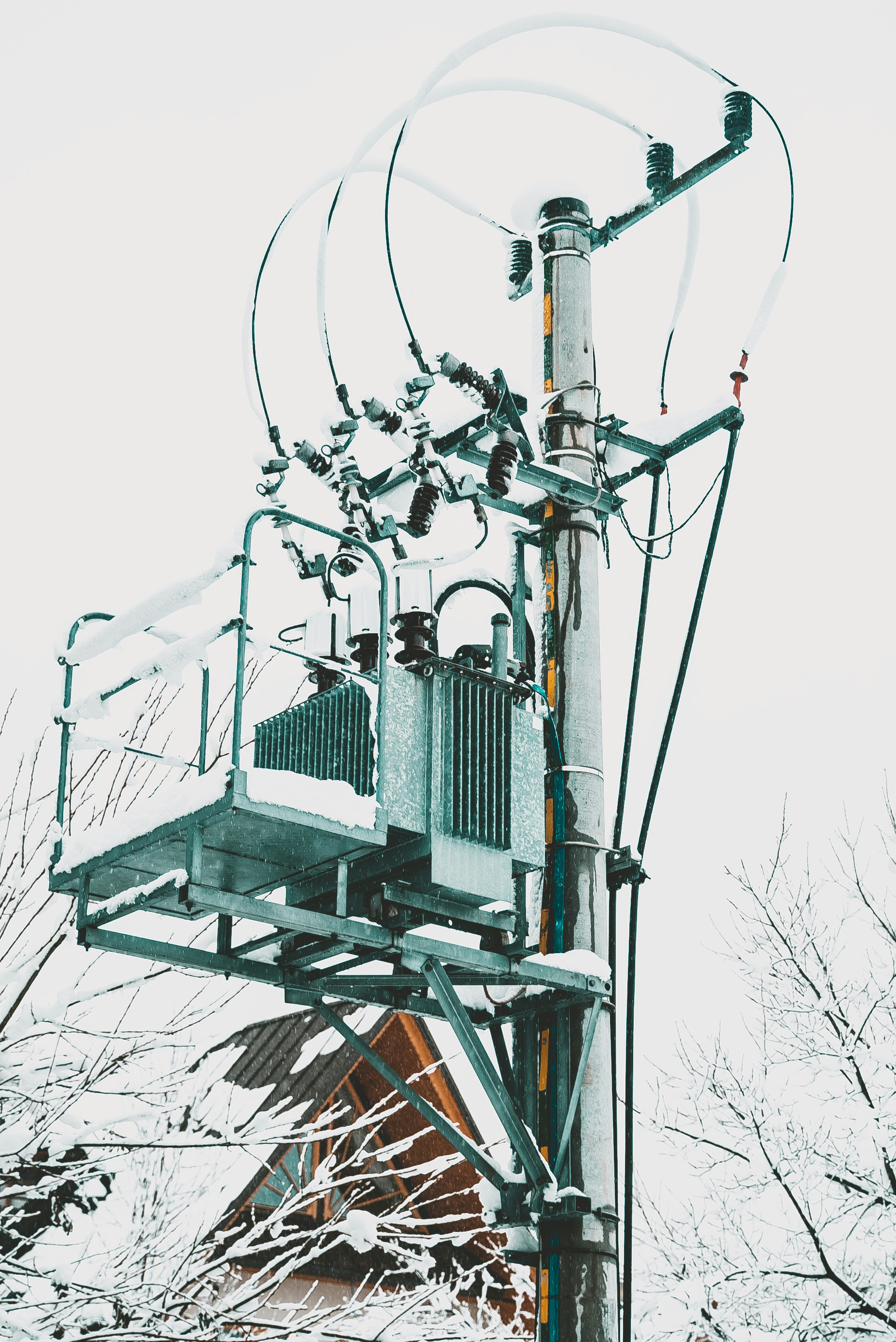 gray utility pole during daytime