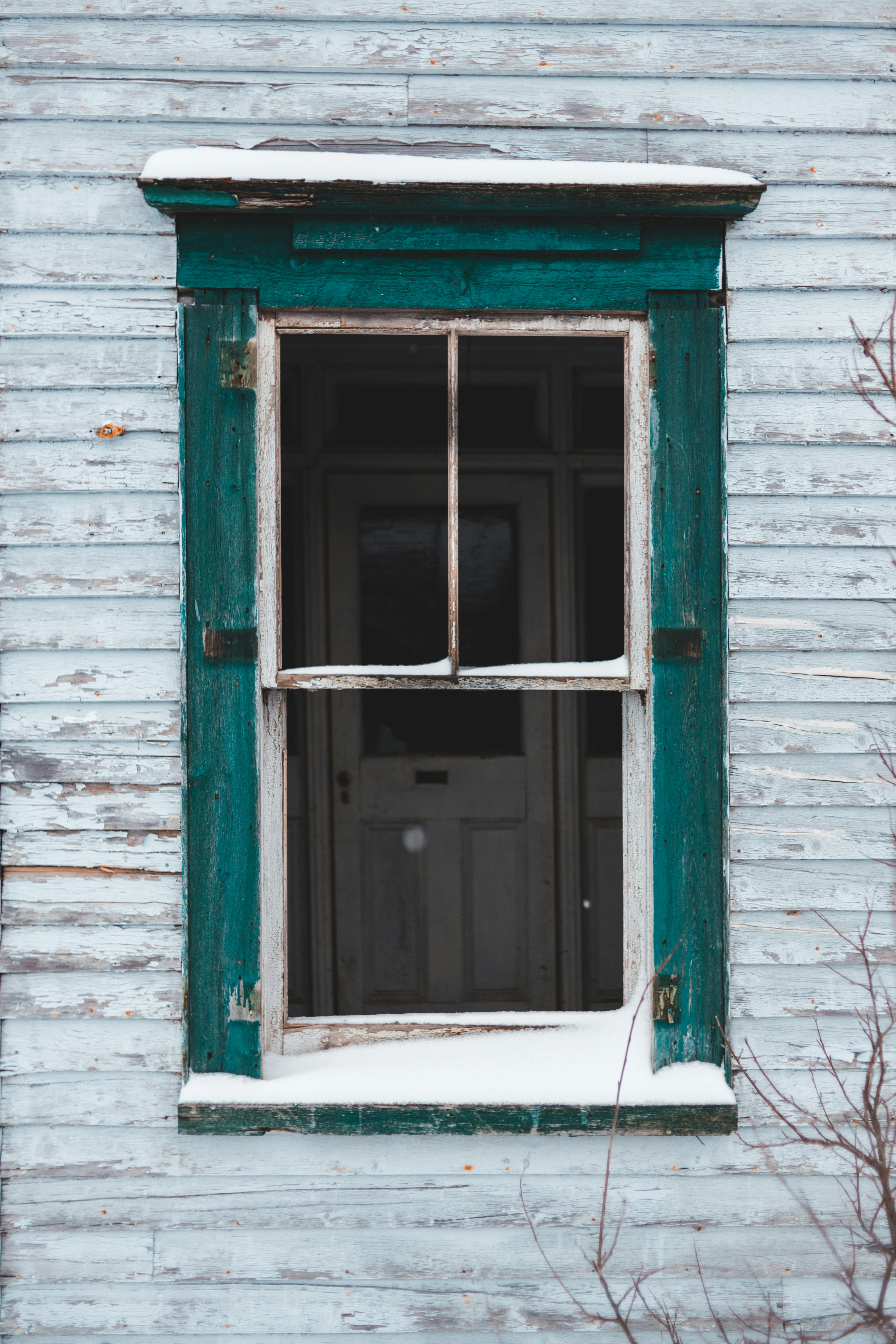 A window with a snow covered window pane photo – Free Grey Image on ...