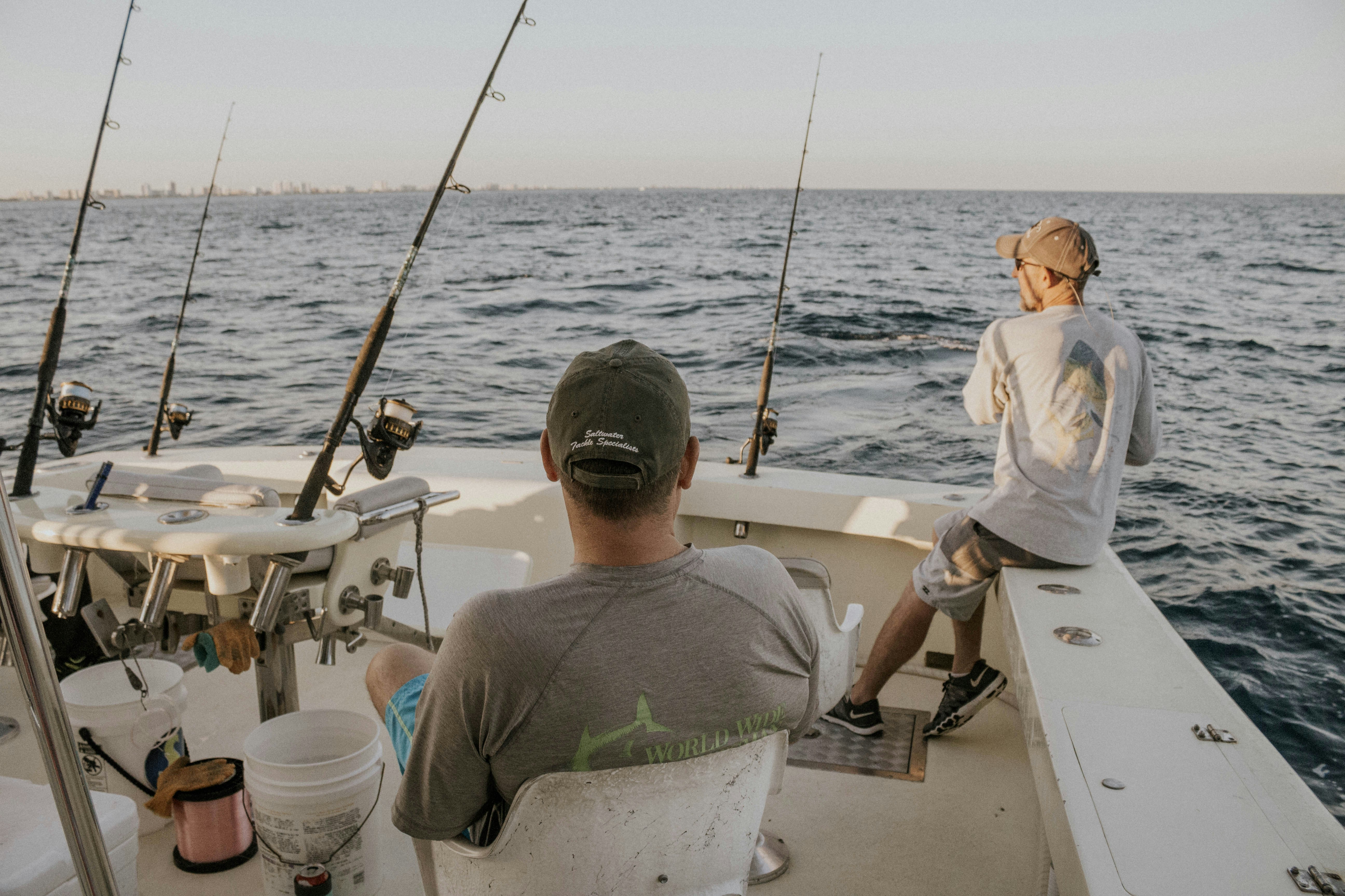 Waterbound Calm: Two Anglers and the Sea's Quiet Horizon