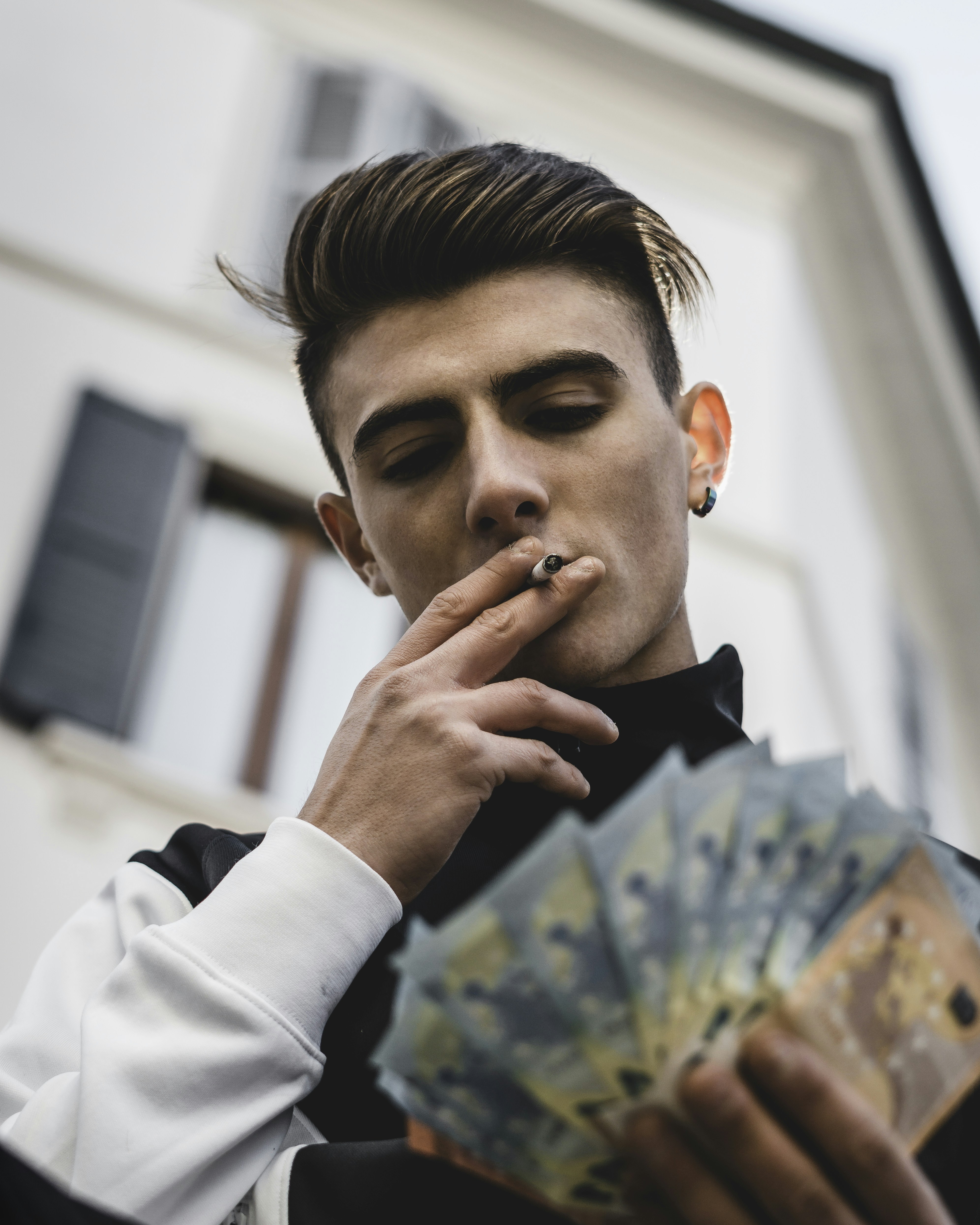 Shadows, Smoke and a Card Trick in Suburban Light