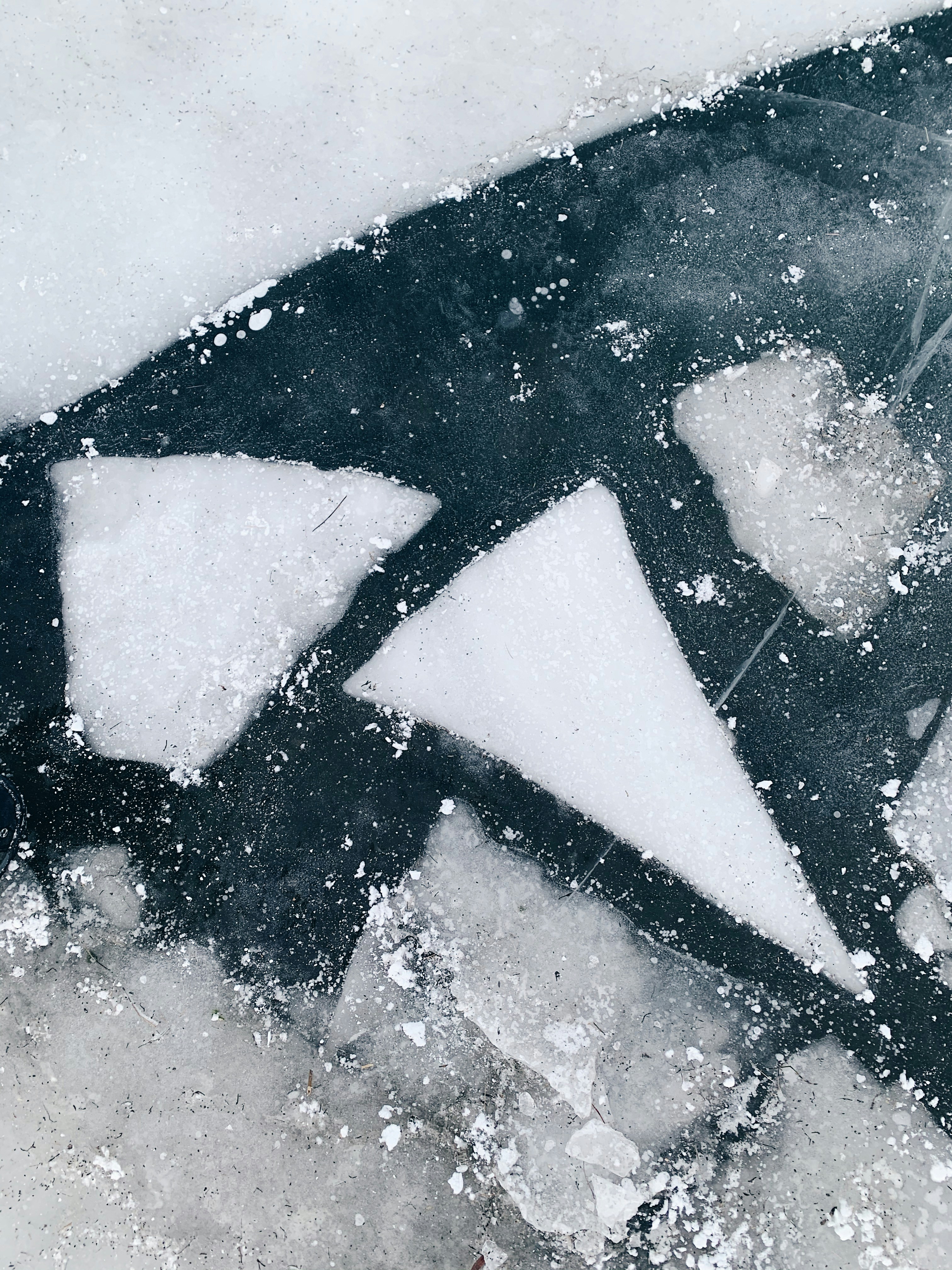 Chiseled Ice Veins Across a Frozen Surface